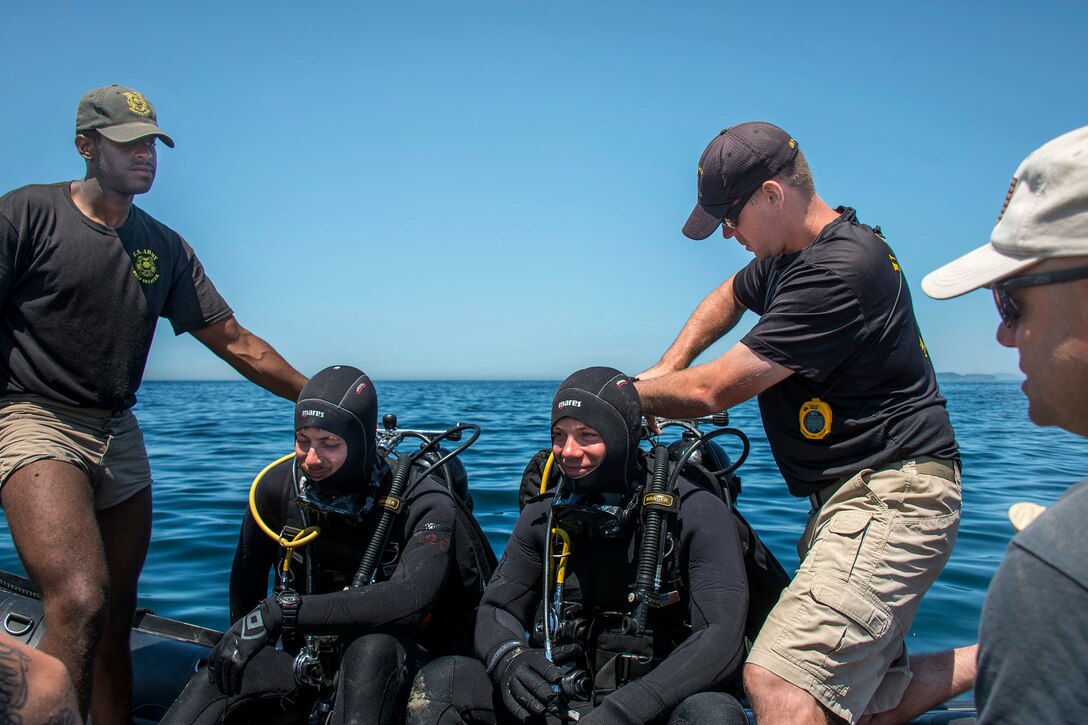 U.S. Army divers survey sea channels during preparations for exercise ...