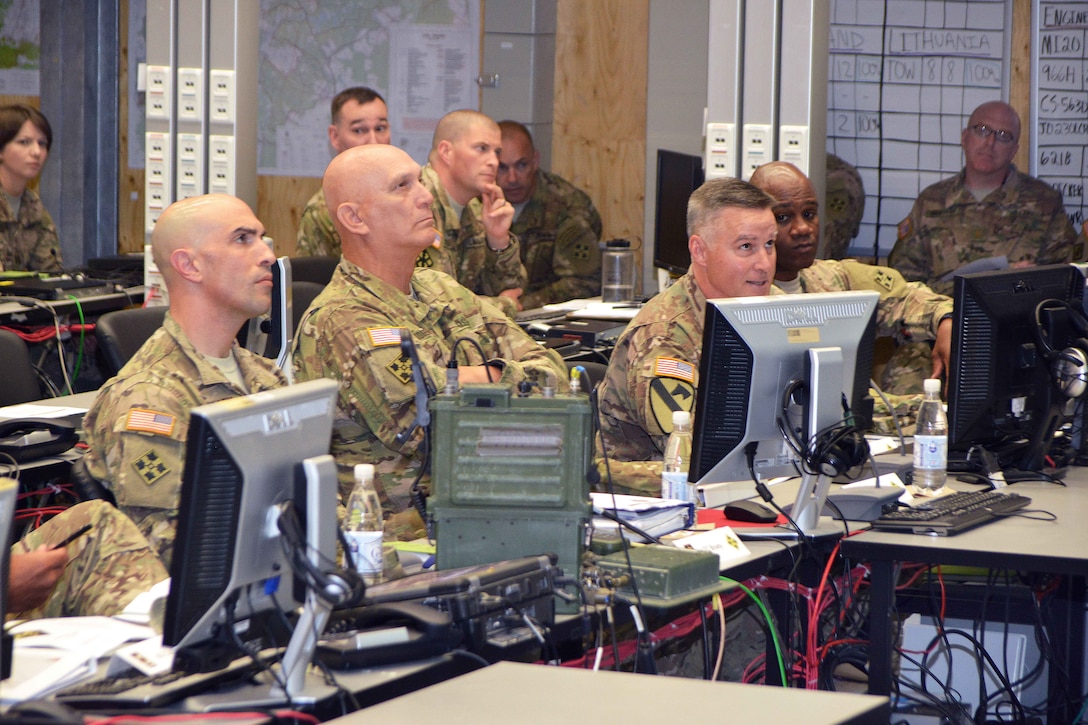 U.S. Army Chief of Staff Gen. Ray Odierno, center left, receives a ...