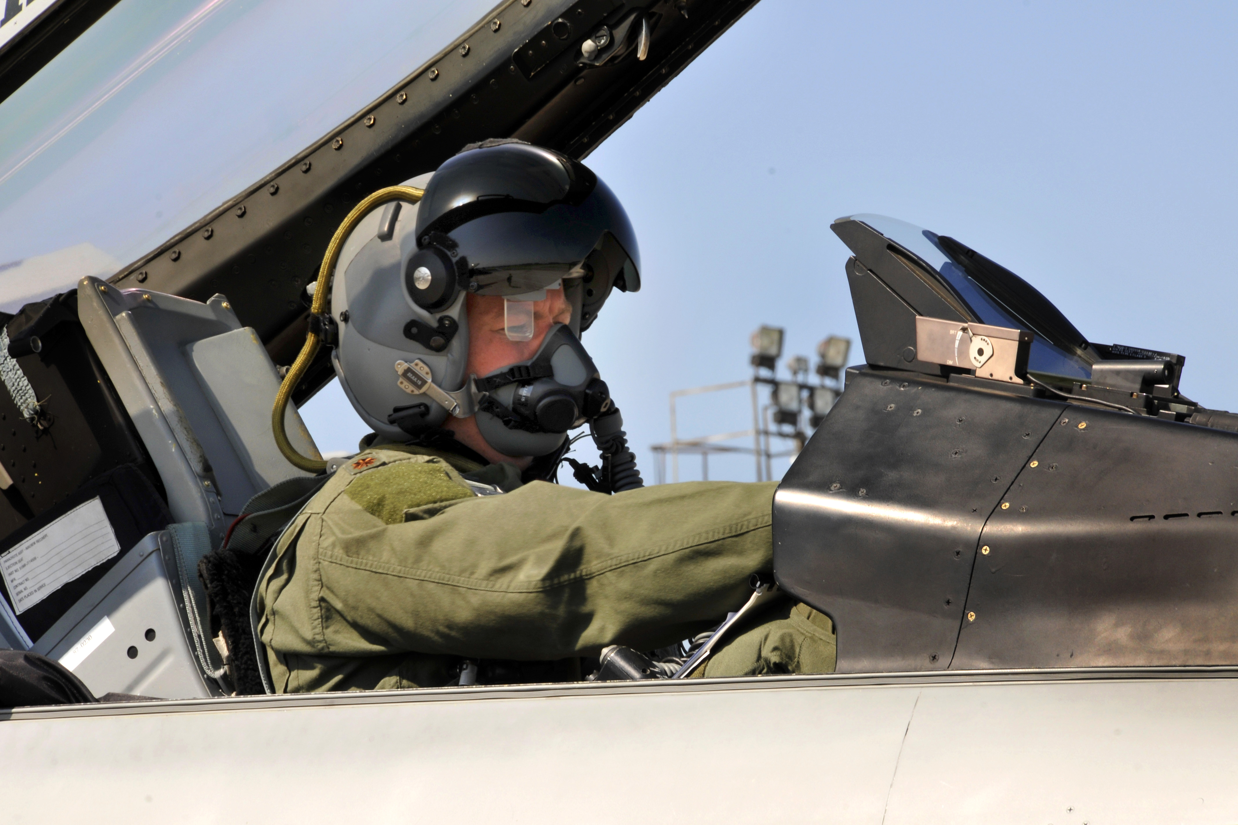 U.S. Air Force Maj. Benjamin Robbins prepares an F-16D Fighting Falcon ...