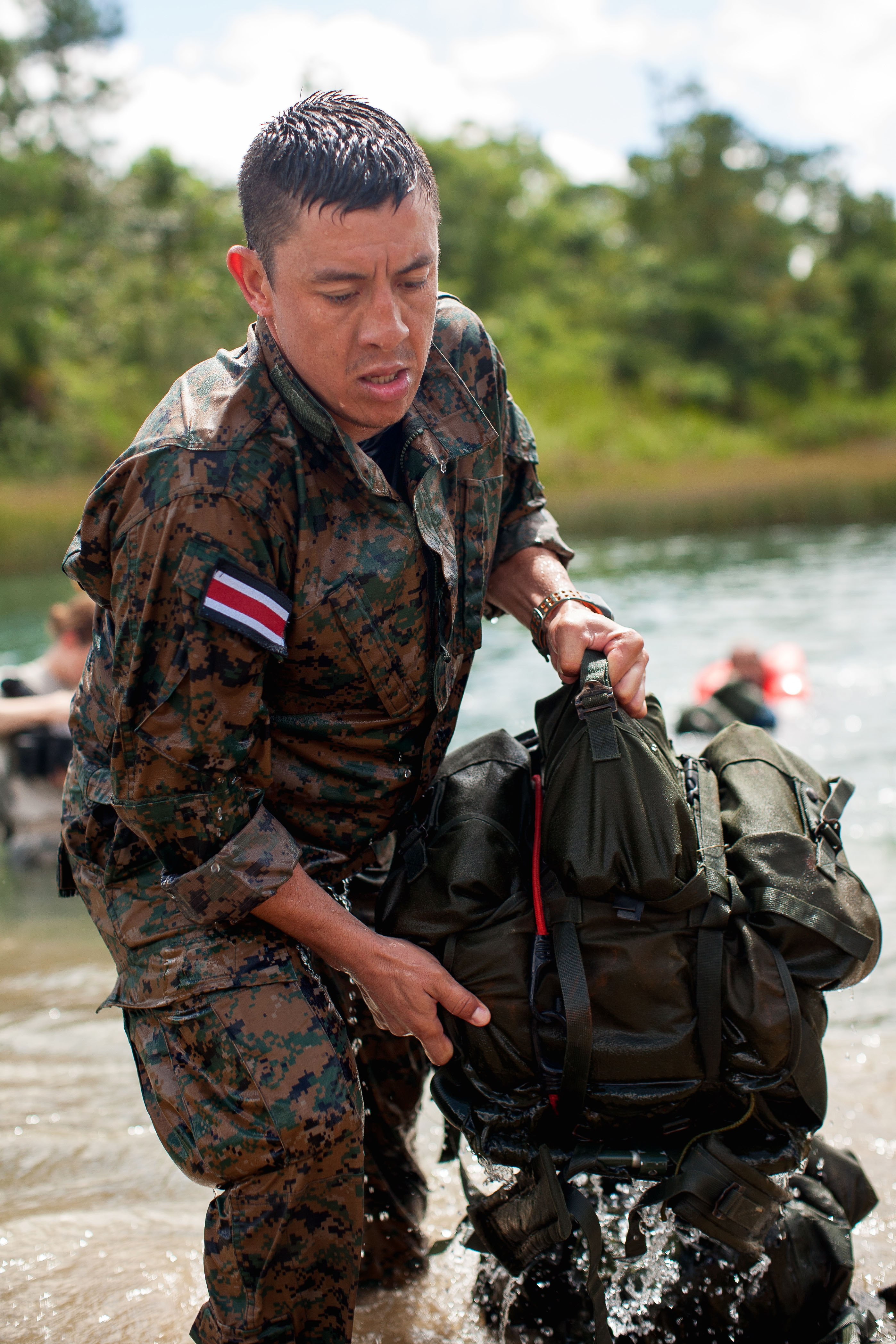A member of the Costa Rican special intervention unit prepares to run ...