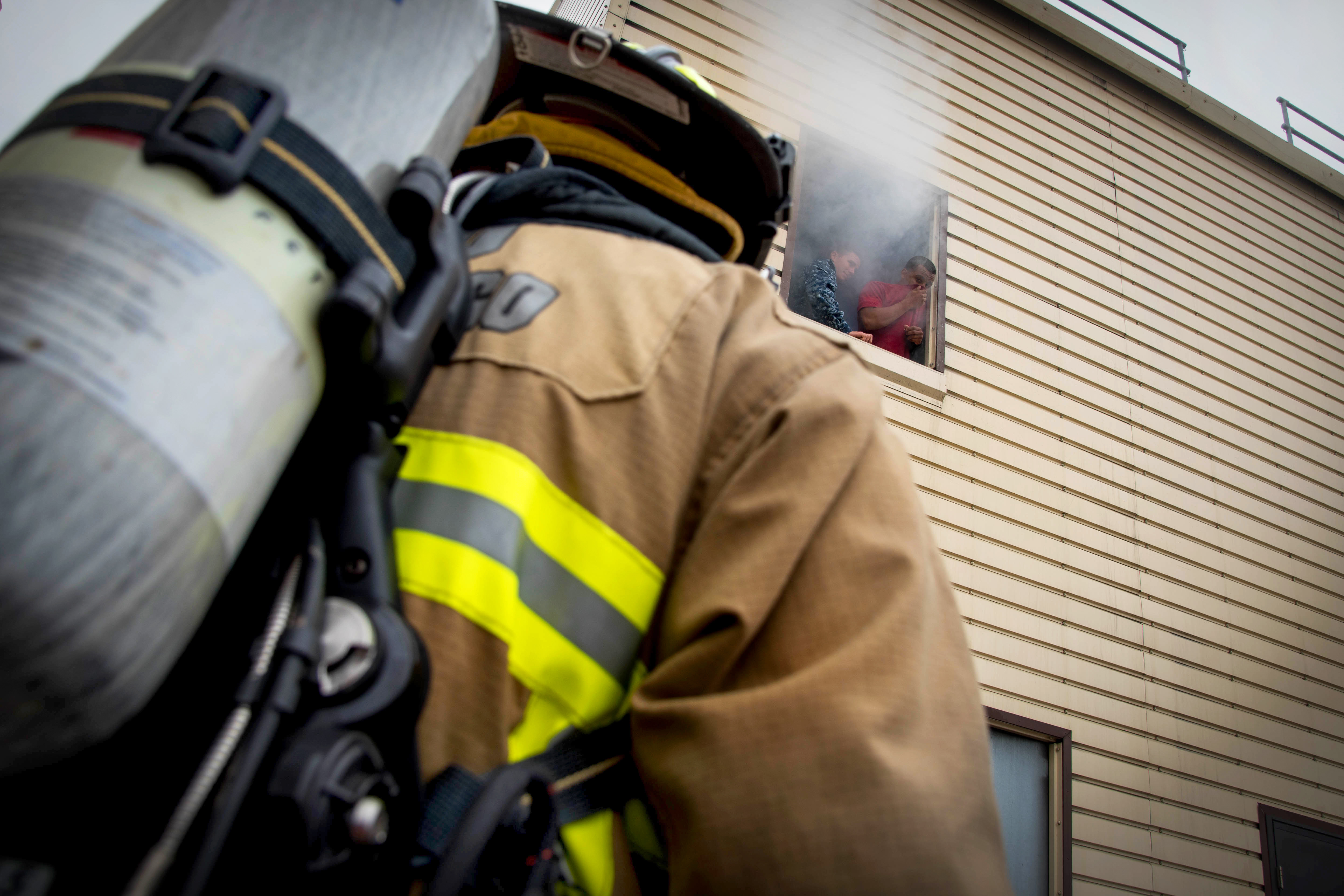Navy Petty Officer 1st Class Ken Haley, top left, and Petty Officer 3rd ...