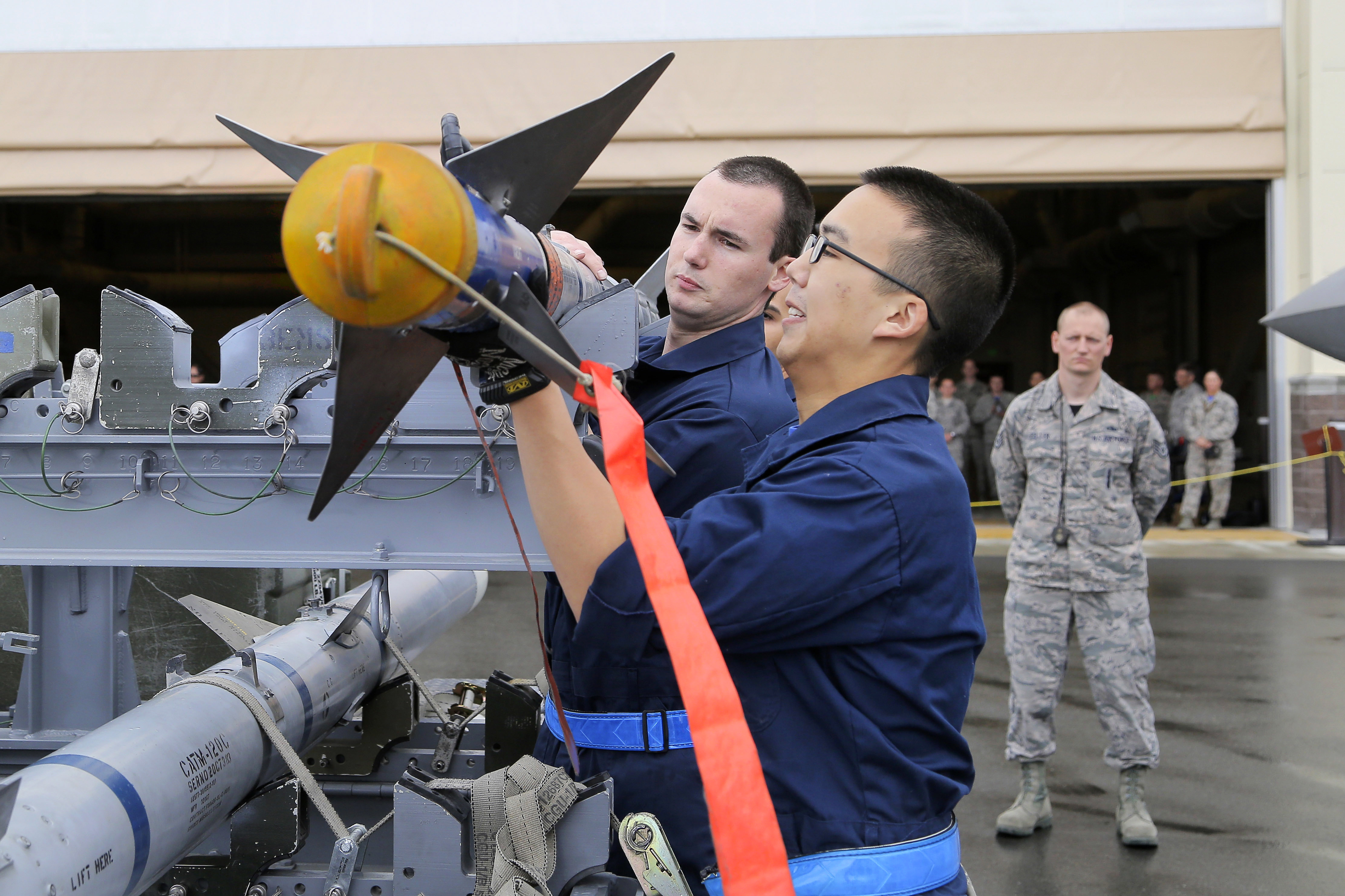 U.S. Air Force Airman 1st Class Kenny Huynh, foreground, Staff Sgt ...