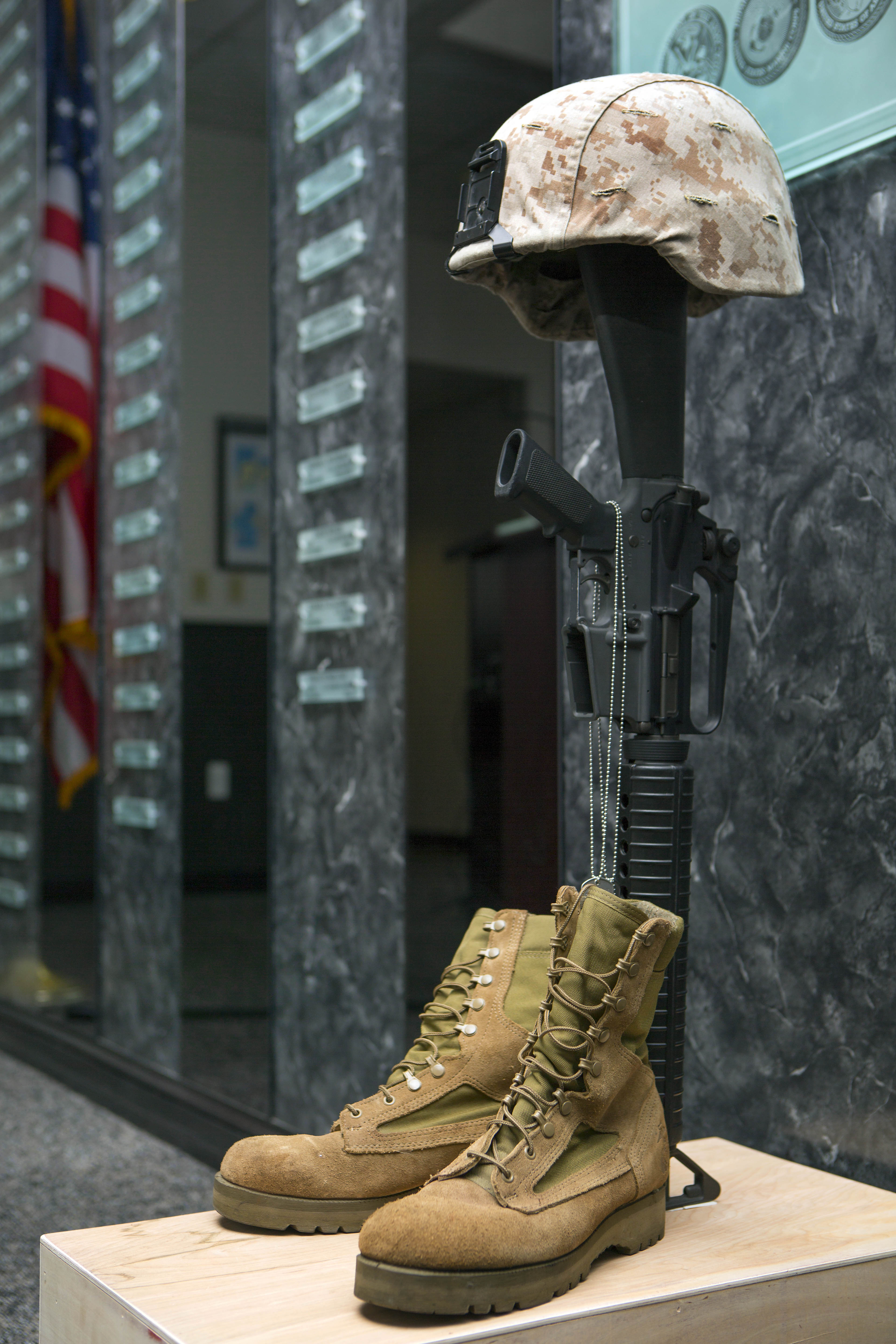 A battlefield cross sits on display in the Hall of Heroes at the ...