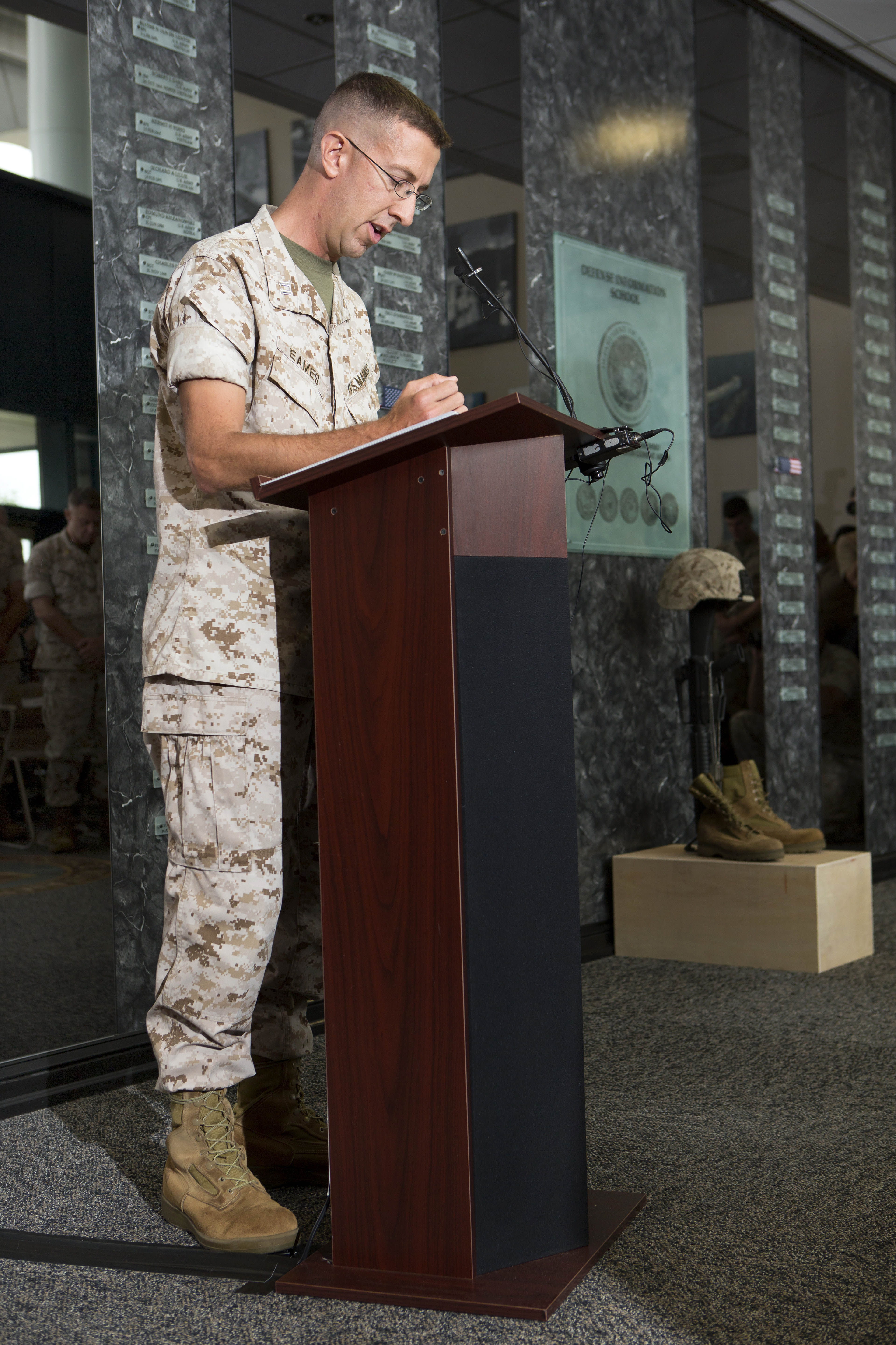 Marine Corps Capt. Caleb Eames gives the opening benediction during a ...