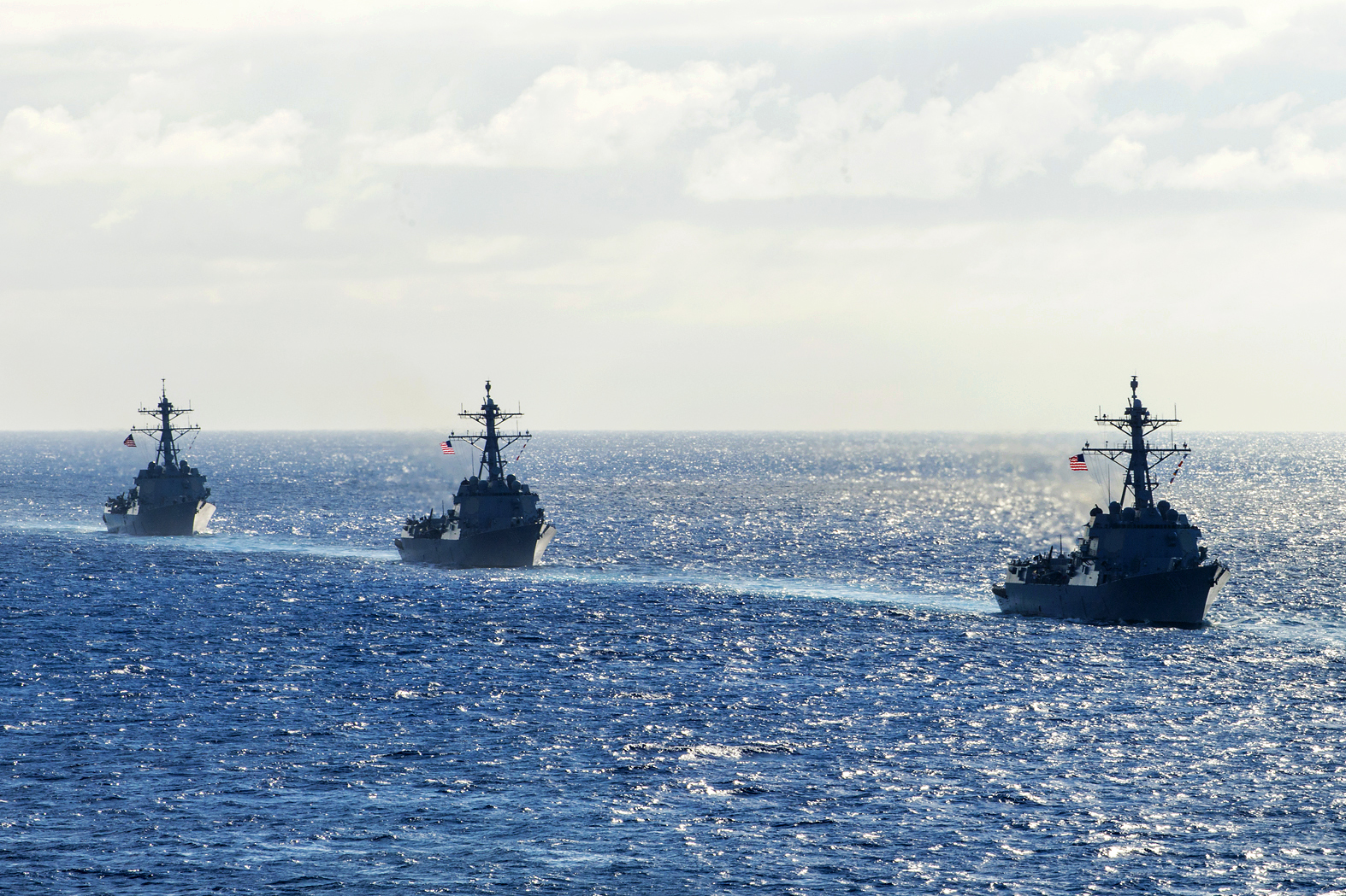 The Guided-missile destroyers USS Sterett, right, USS Gridley, center ...