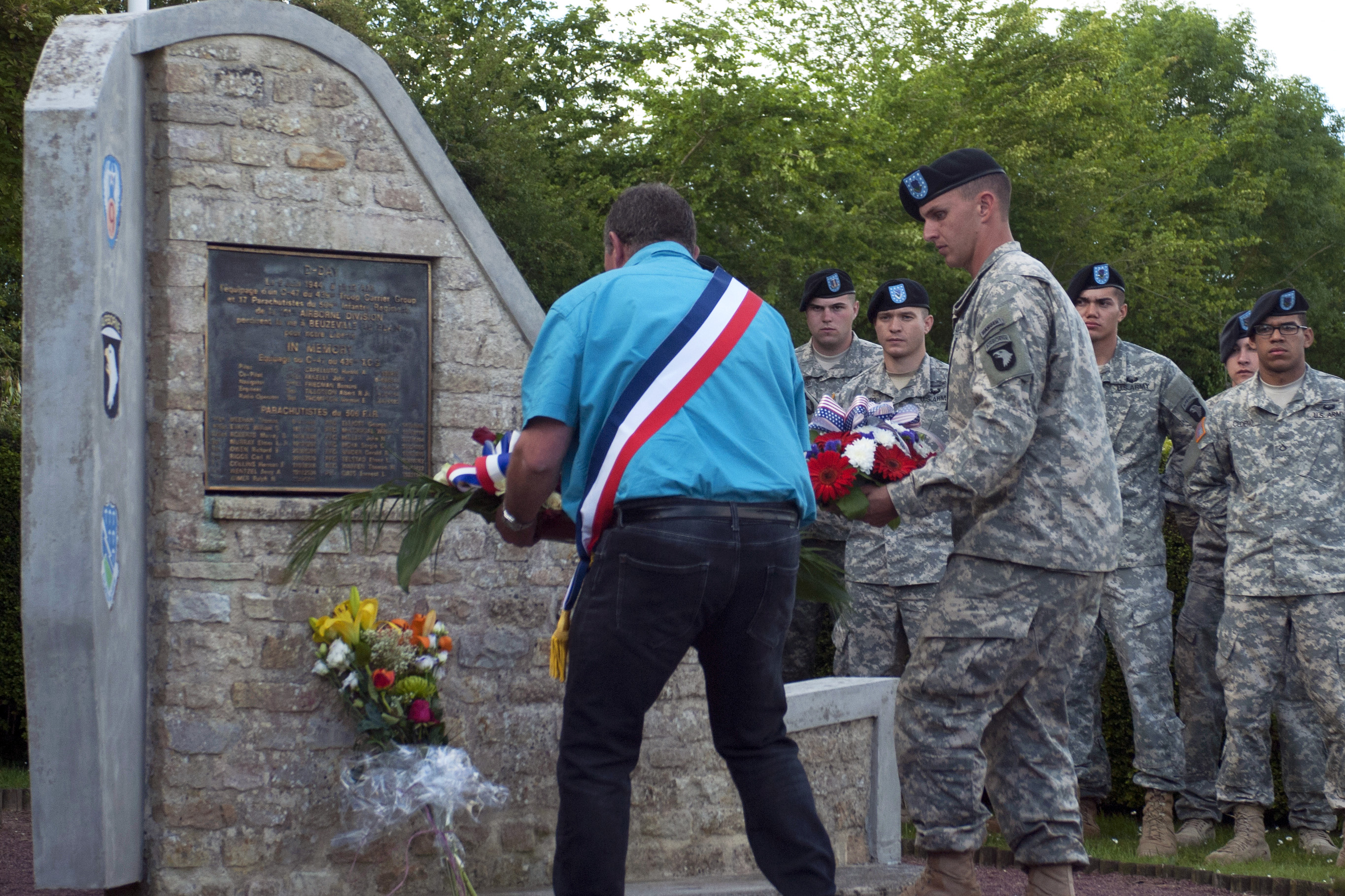 U.S. Army Staff Sgt. James Smith places a wreath to honor 1st Lt ...