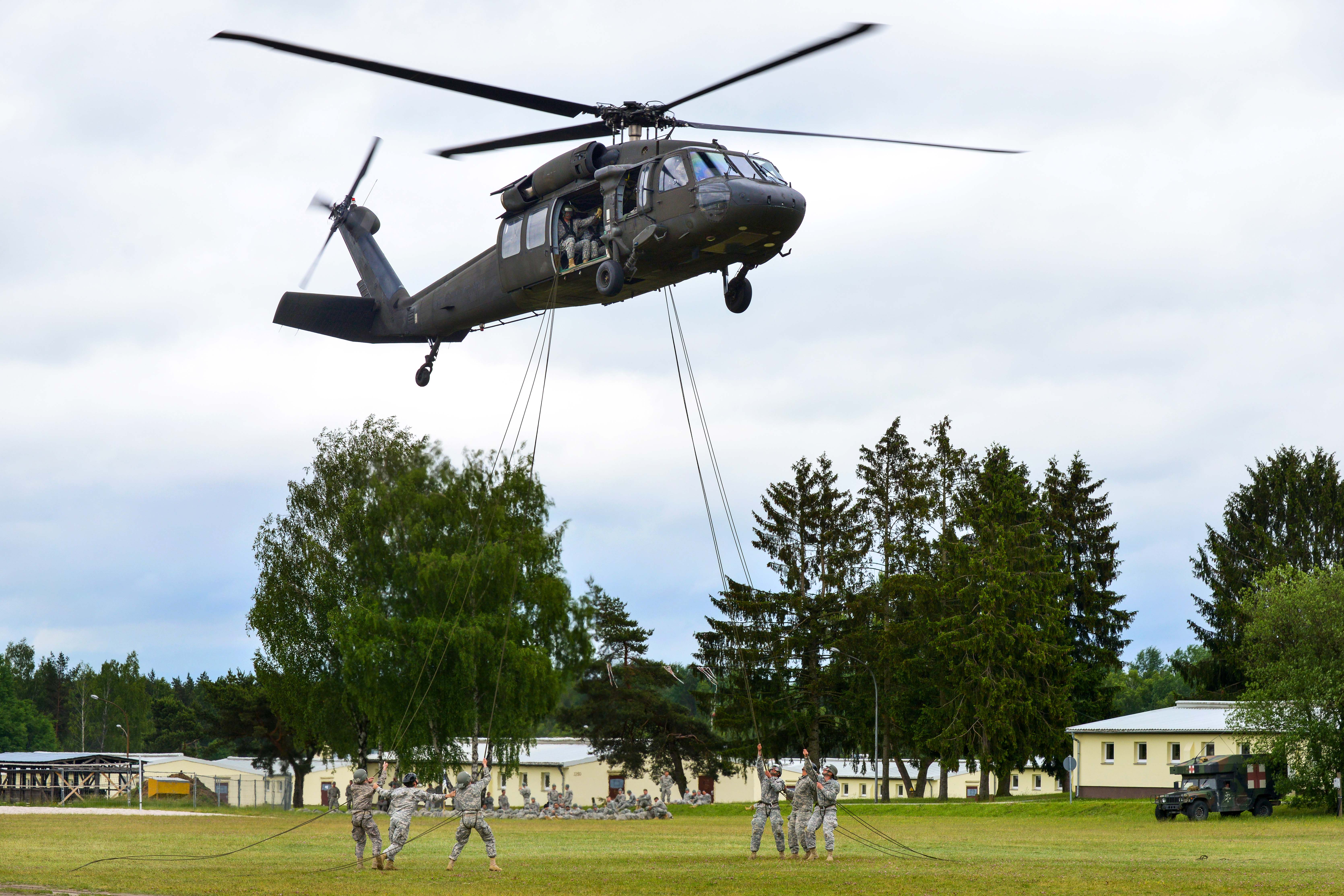 U.S. troops conduct rappel operations from a UH-60 Black Hawk ...