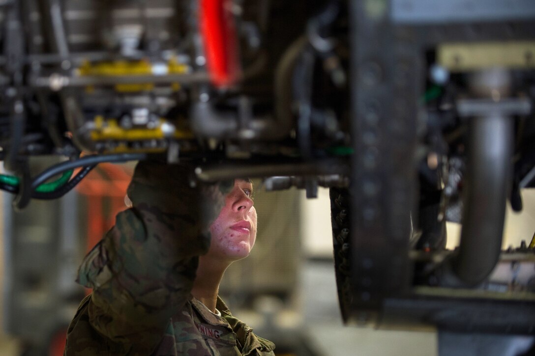 U.S. Air Force Senior Airman Jaid Downing performs a 400-hour engine ...