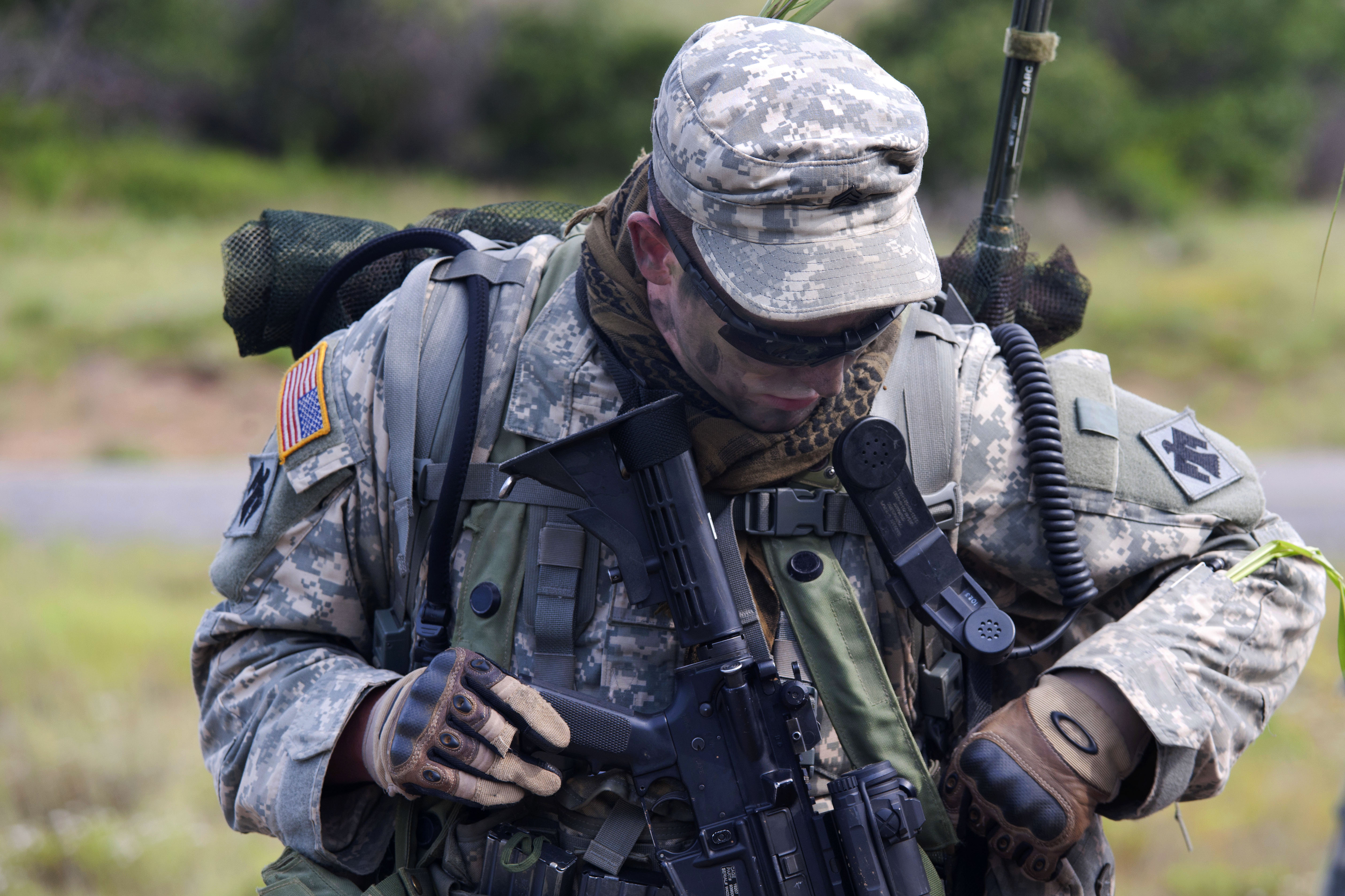 Oklahoma Army National Guard Sgt. Ryan McKey prepares for a ...