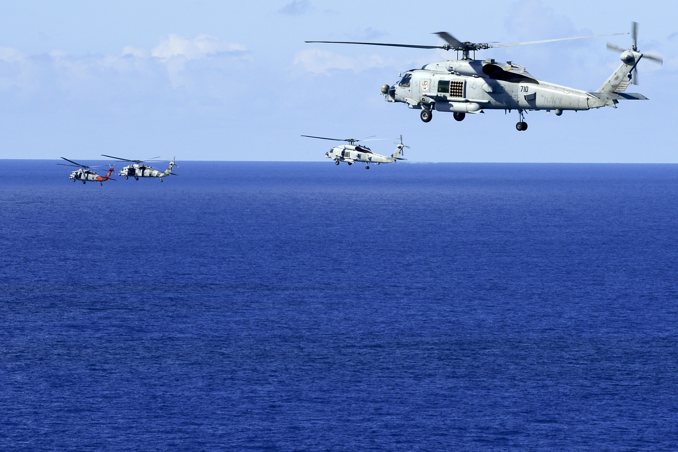 U.S. Navy MH-60R Sea Hawk helicopters from Maritime Strike Squadron 73 ...