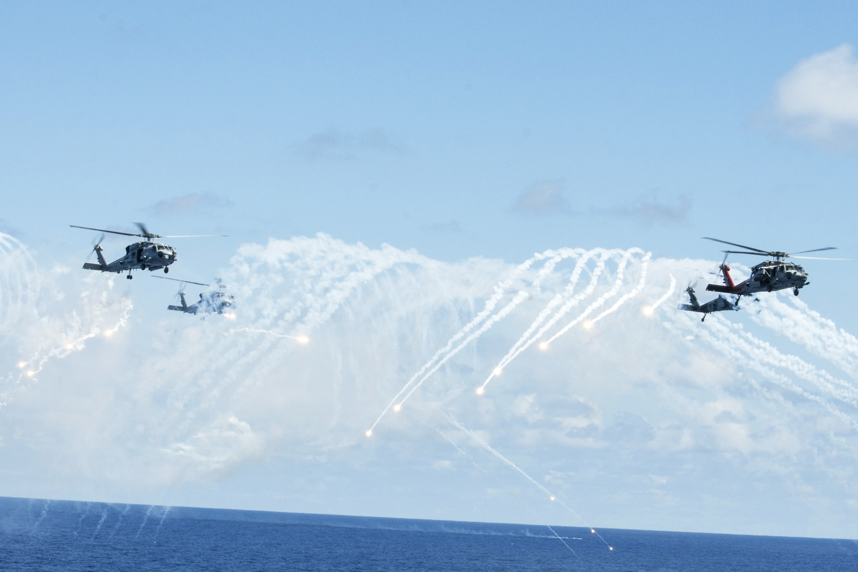 U.S. Navy MH-60R Sea Hawk helicopters attached to Helicopter Maritime ...