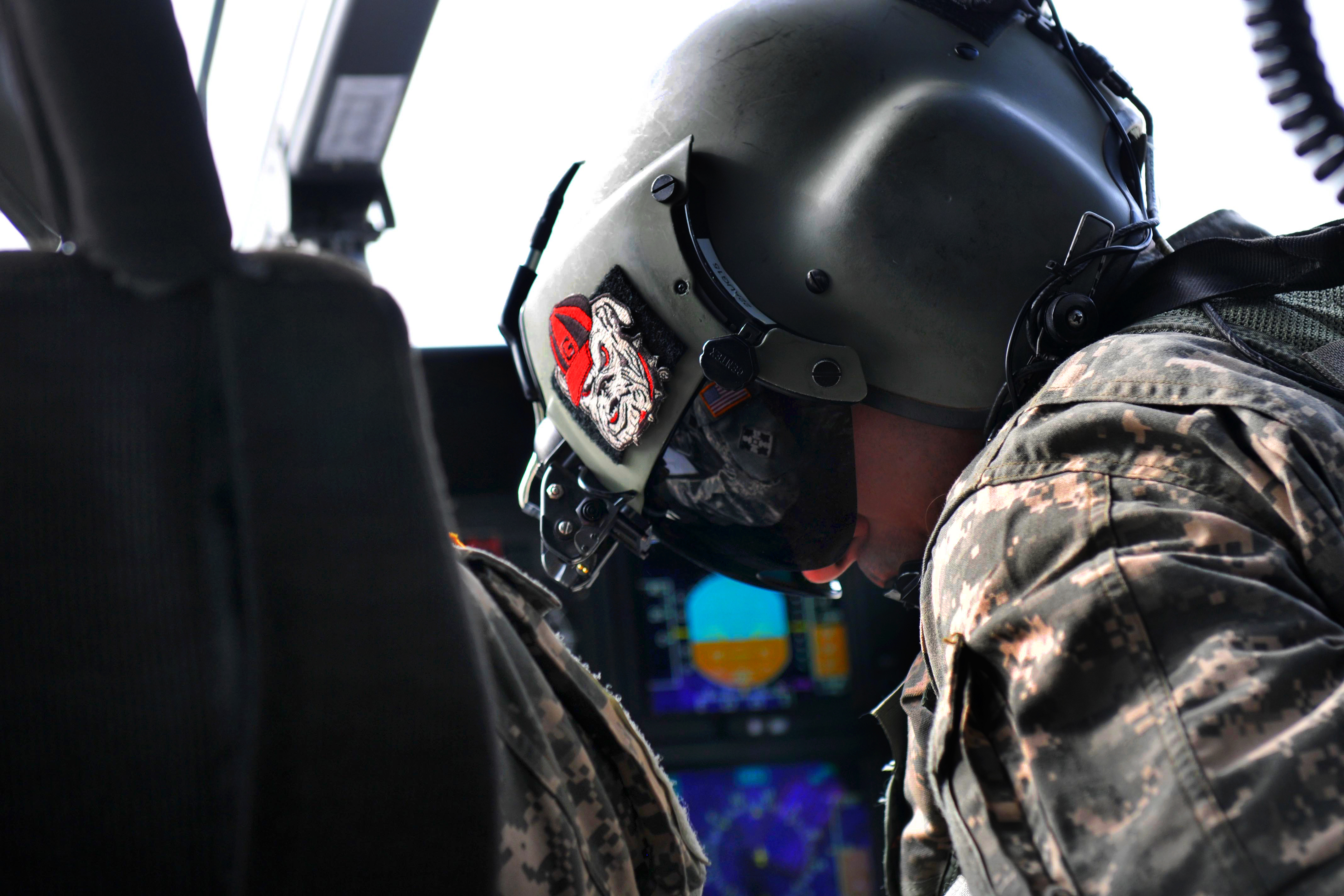 Army Cpt. Chris Jones performs final pre-flight inspection on a UH-72A ...