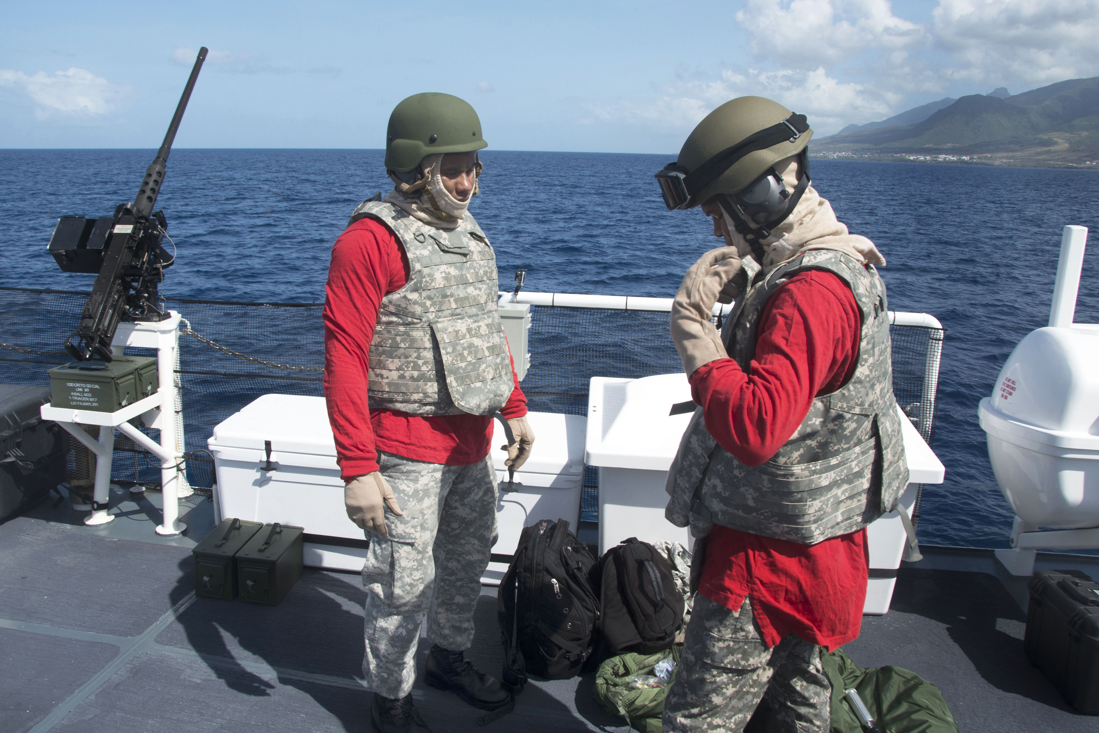 Dominican Navy Petty Officer 2nd Class Apolinar Perez Perez, left, and ...