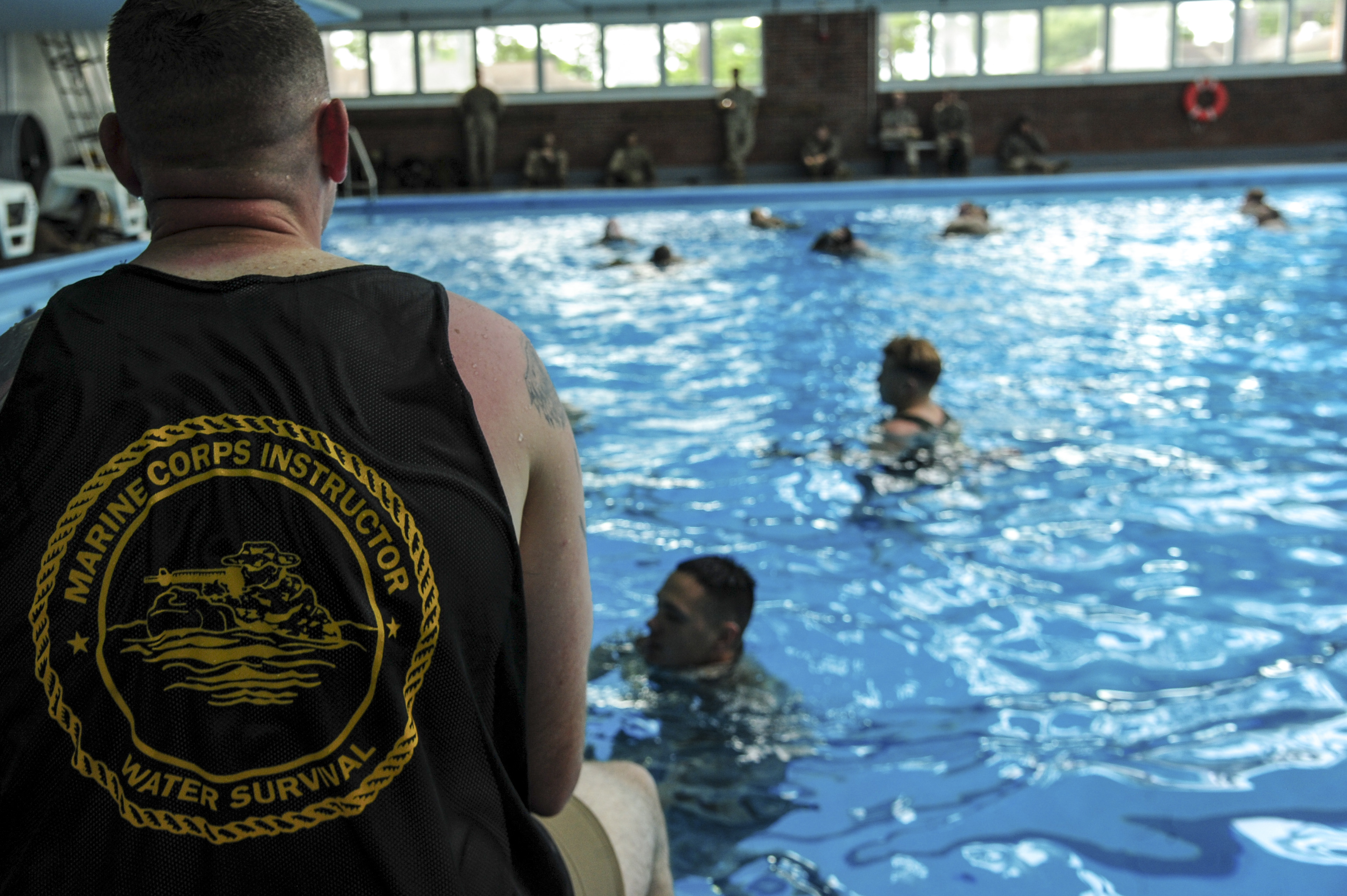 U.S. Marines dive into water survival training