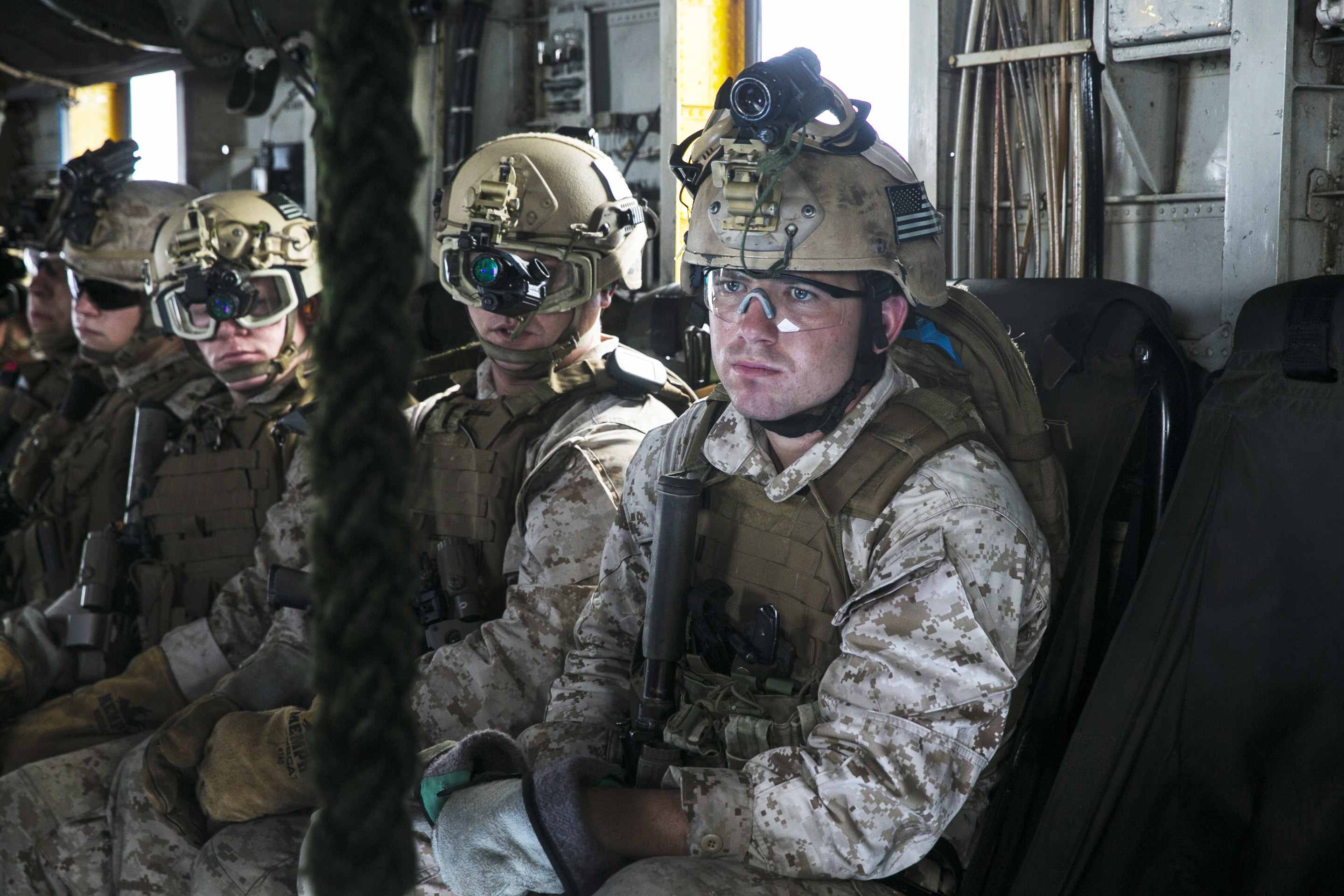 U.S. Marine Corps Sgt. Zach Ray, right, and fellow members of the 15th ...
