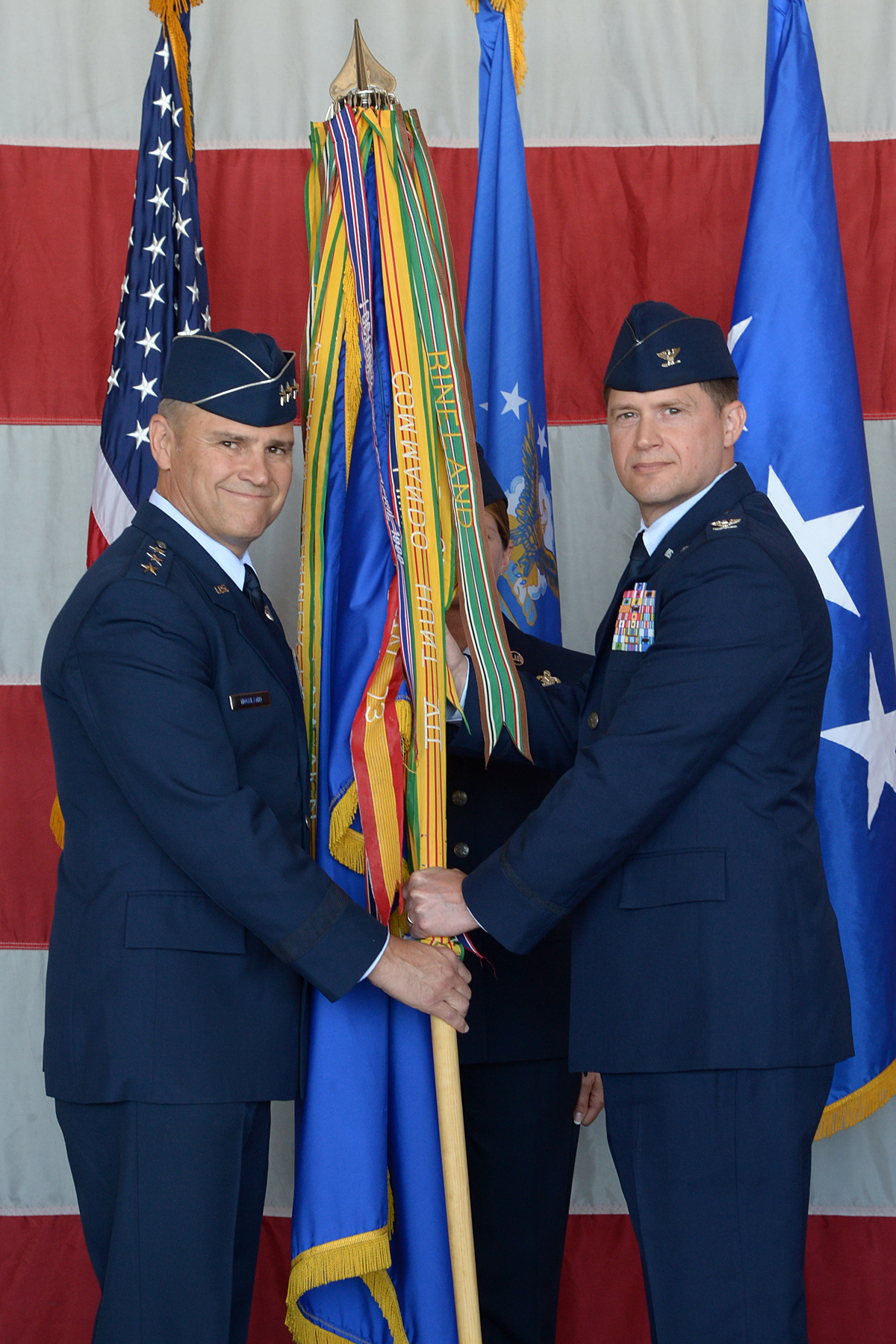 Lt. Gen. Chris Nowland passes the guidon to 388 Fighter Wing Commander ...