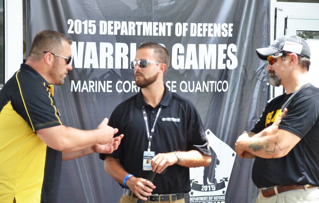 U.S. Army veterans Sean Hook, left, and Billy Meeks, right, talk ...