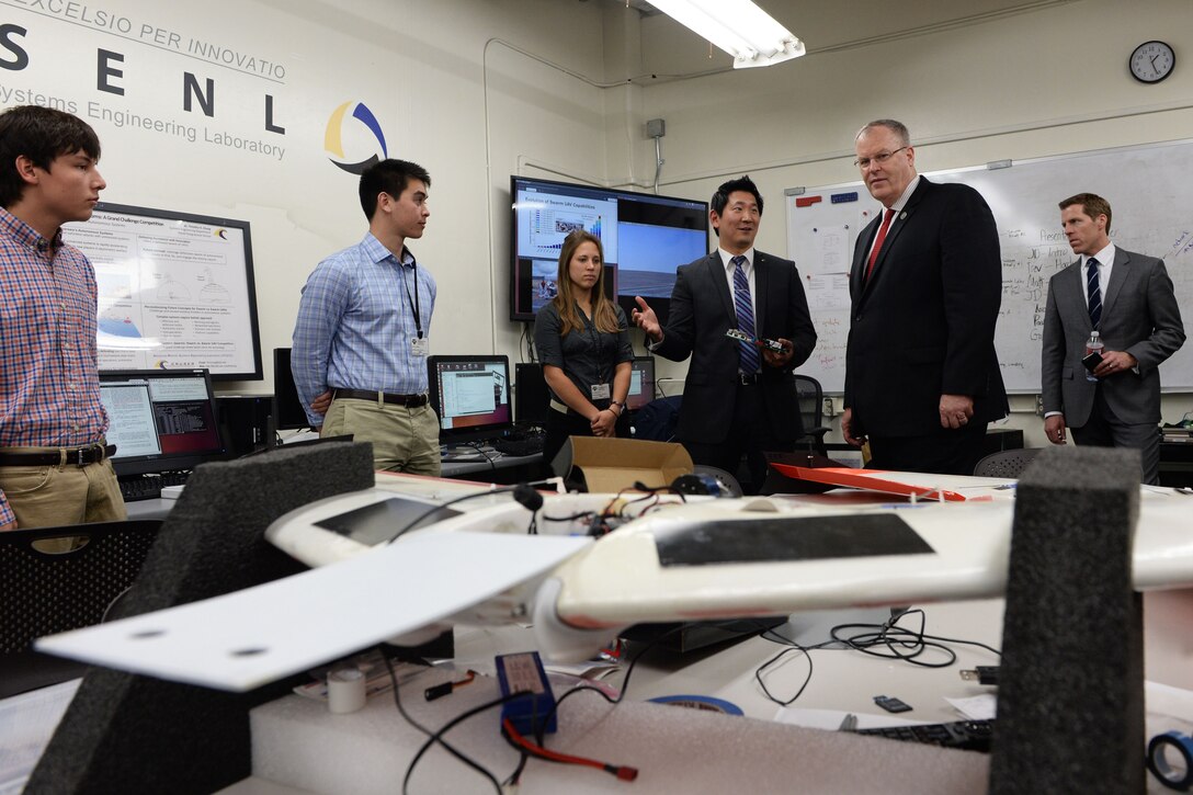 Deputy Defense Secretary Bob Work meets with Tim Chung, deputy director ...