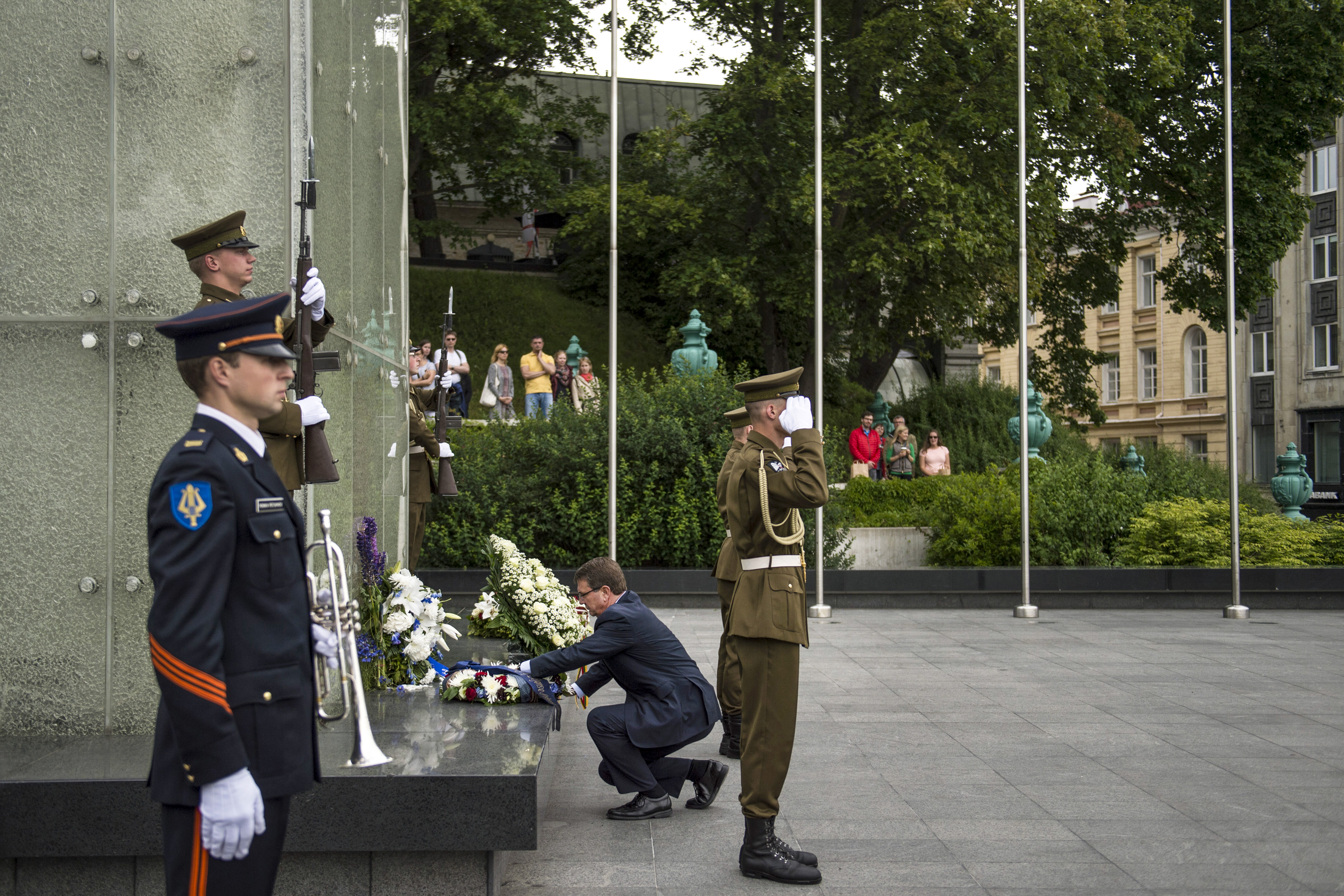 U.S. Defense Secretary Ash Carter participates in a wreath-laying ...