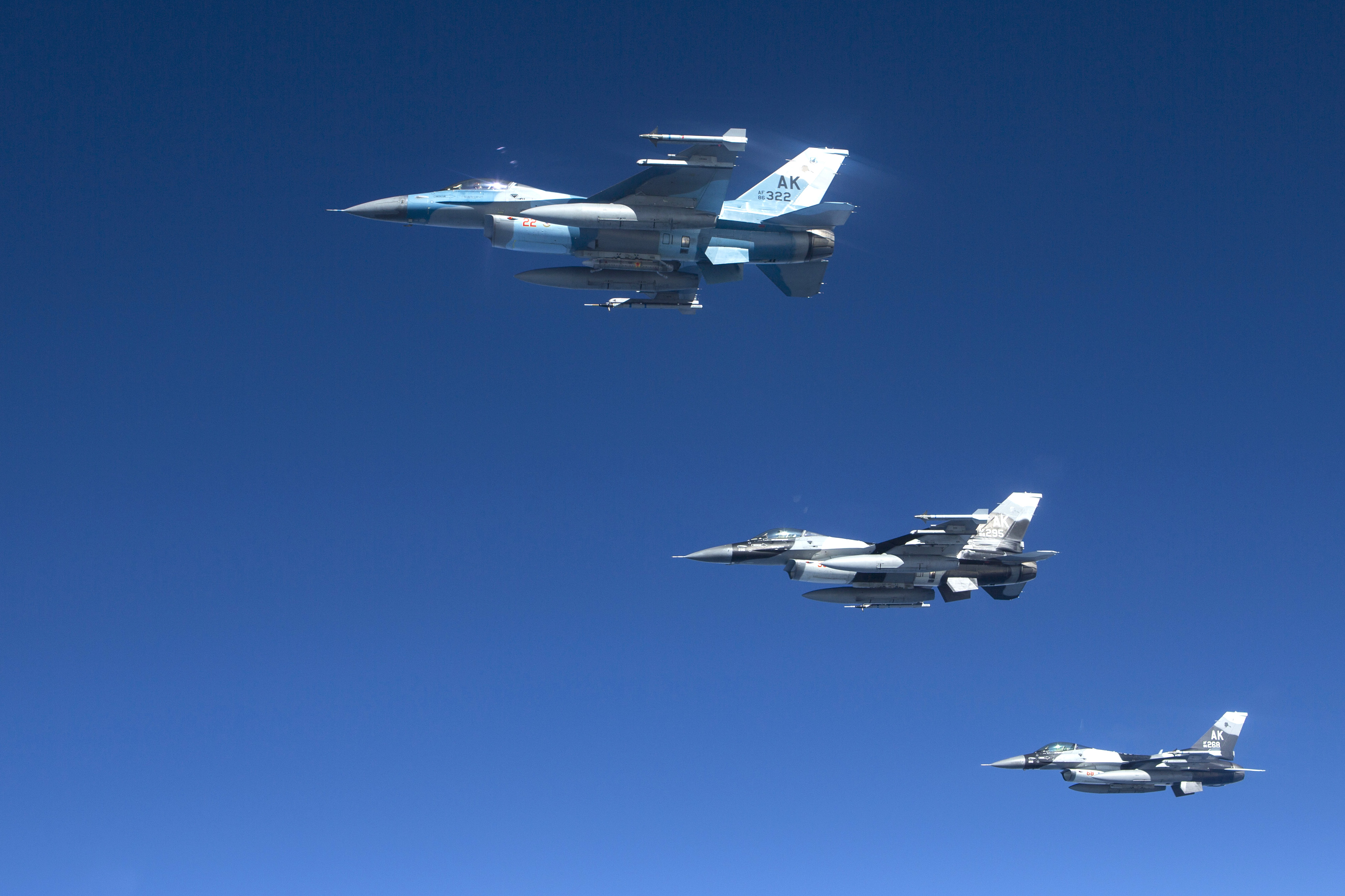 U.S. Air Force F-16 Fighting Falcons conduct a training mission over ...