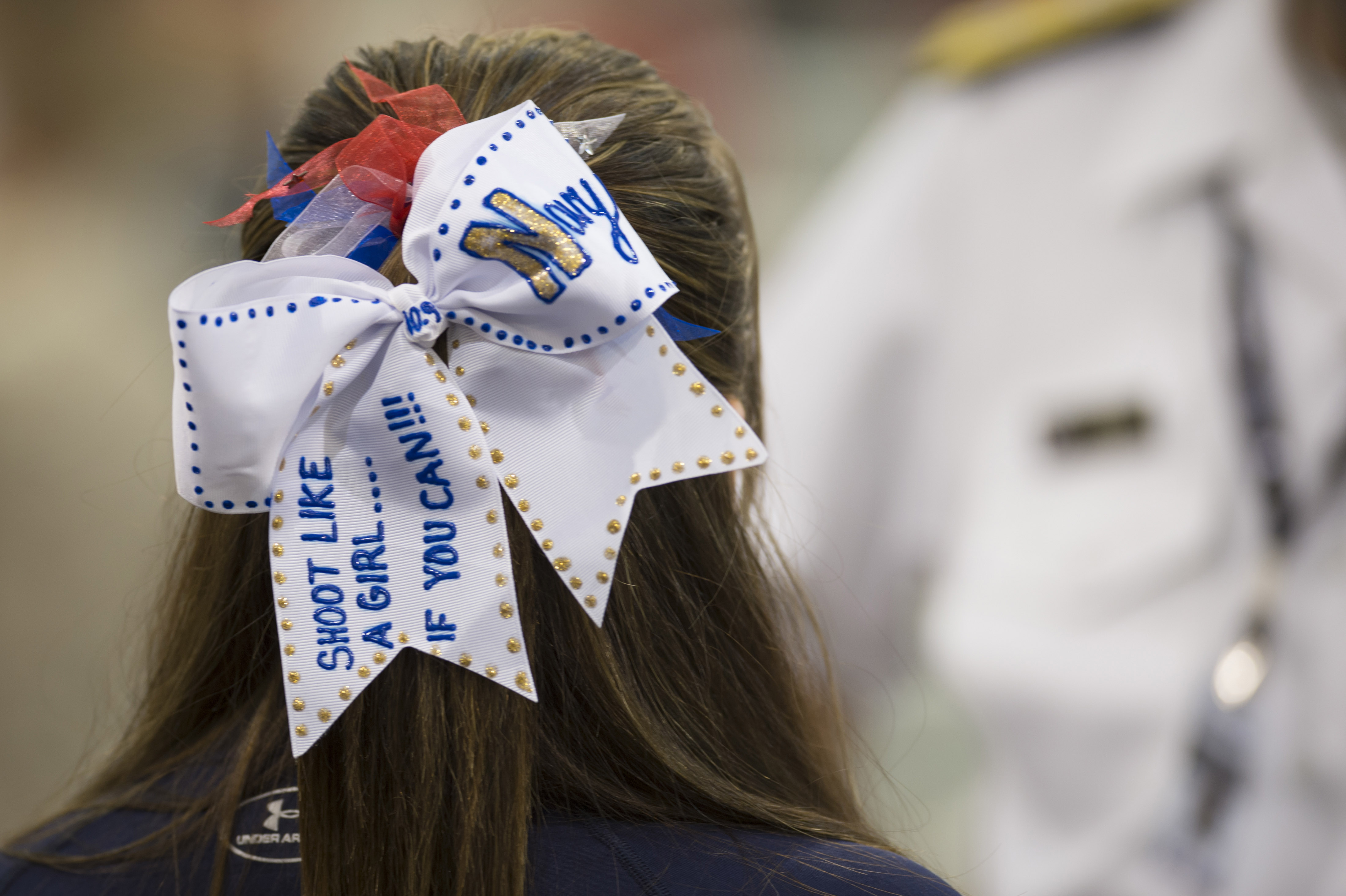 Retired U.S. Navy airman Sadie Strong wears a bow in support of Team ...