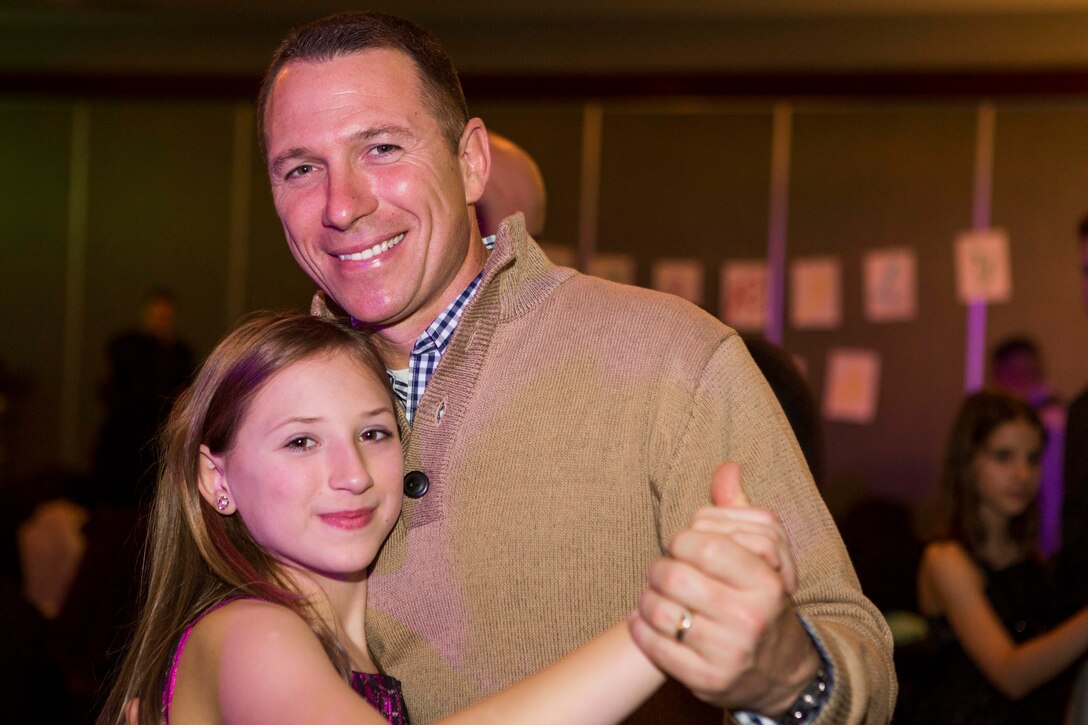 Fathers, daughters dance night away