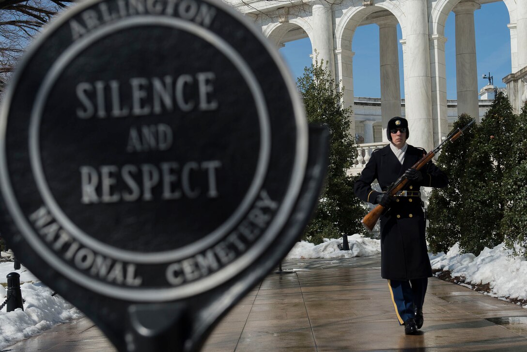 An honor guard soldier prepares to take the watch at the Tomb of the ...