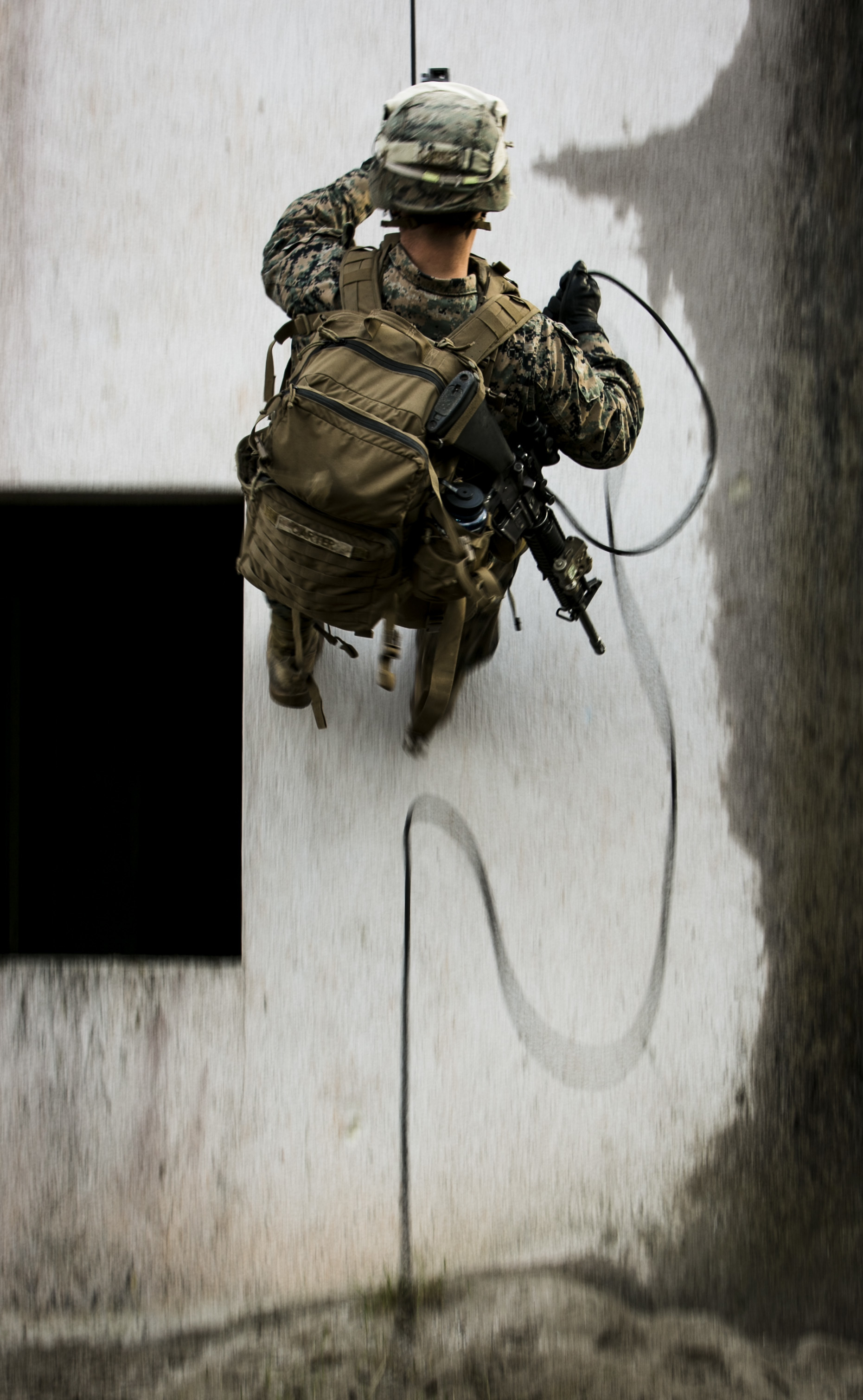 Down and Out: MAGTF Marines rappel with Special Forces