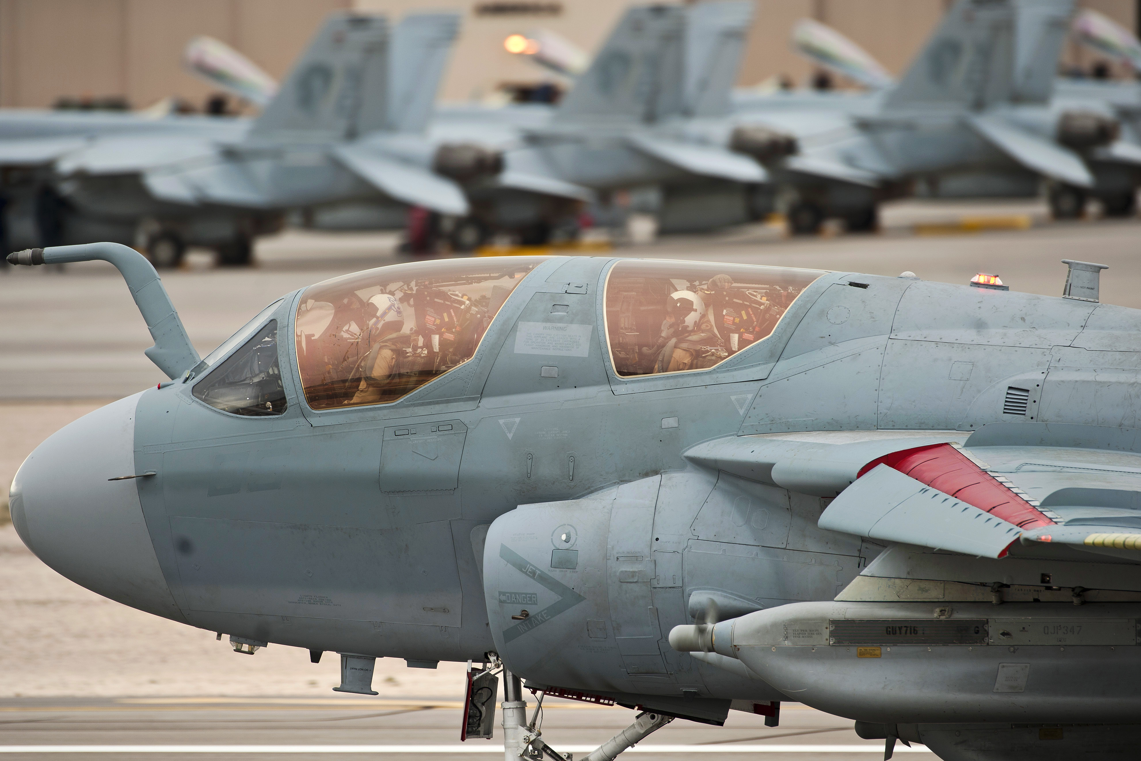 U.S. Marine Corps aircrew members operate an EA-6B Prowler aircraft ...