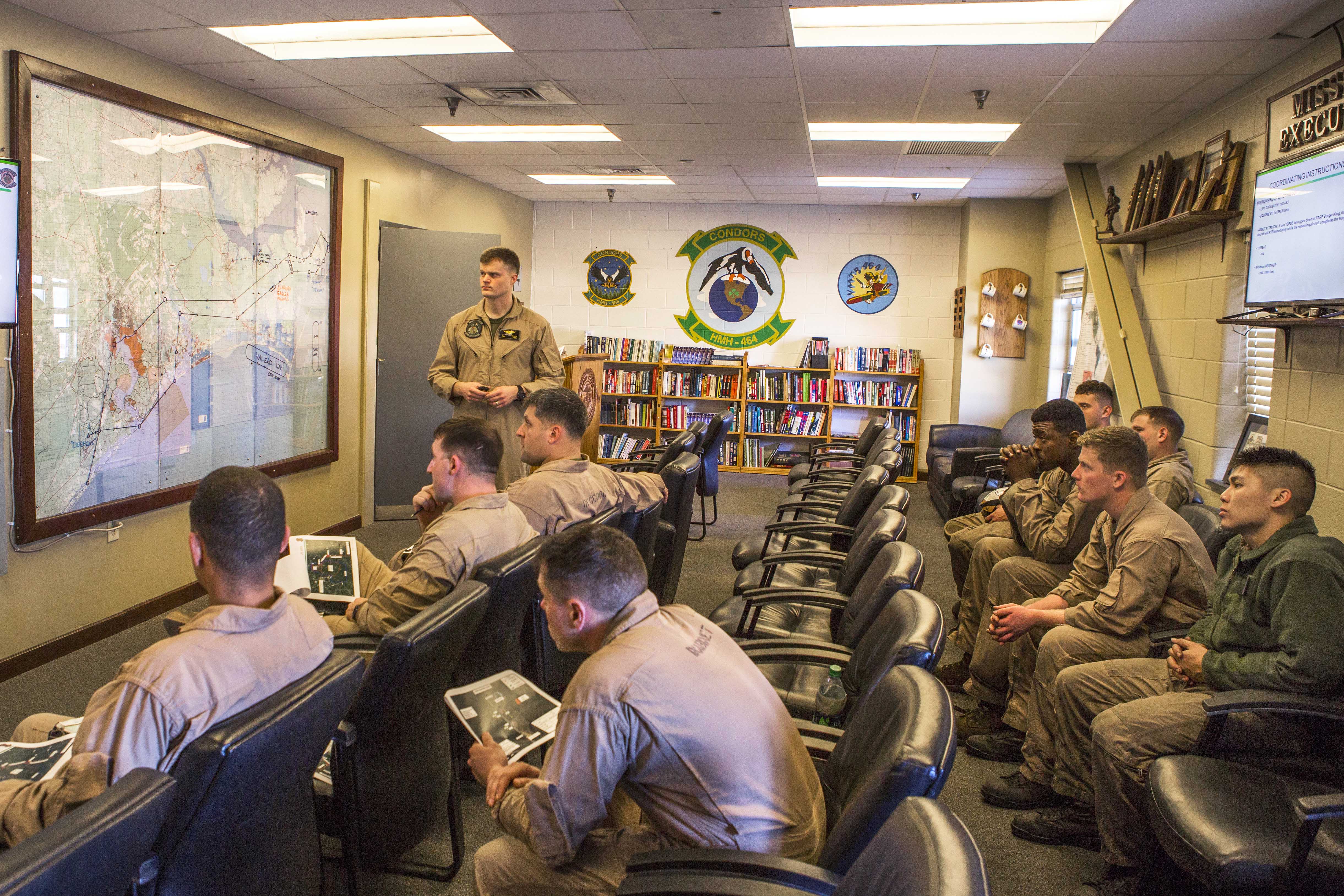 Marines conduct a pre-flight brief before departing Marine Corps Air ...