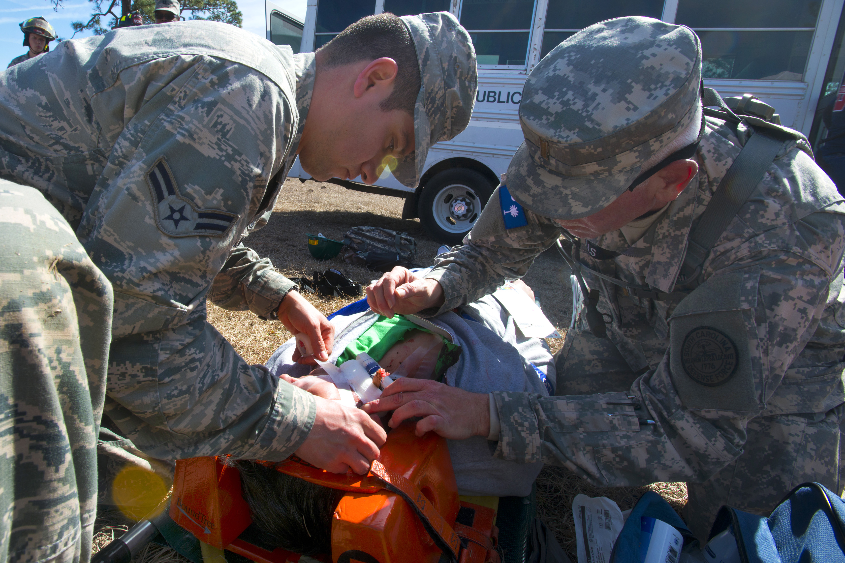 Air Force Airman 1st Class Ishmael Gutierrez, left, assists first ...
