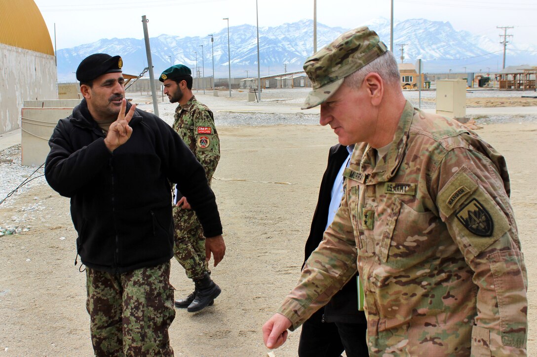 U.S. Army Maj. Gen. Mike Murray, right, deputy commander, U.S. Forces ...