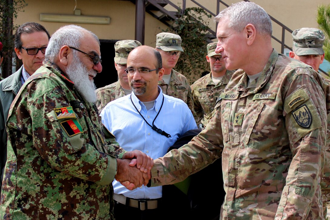 U.S. Army Maj. Gen. Mike Murray, right, deputy commander, U.S. Forces ...