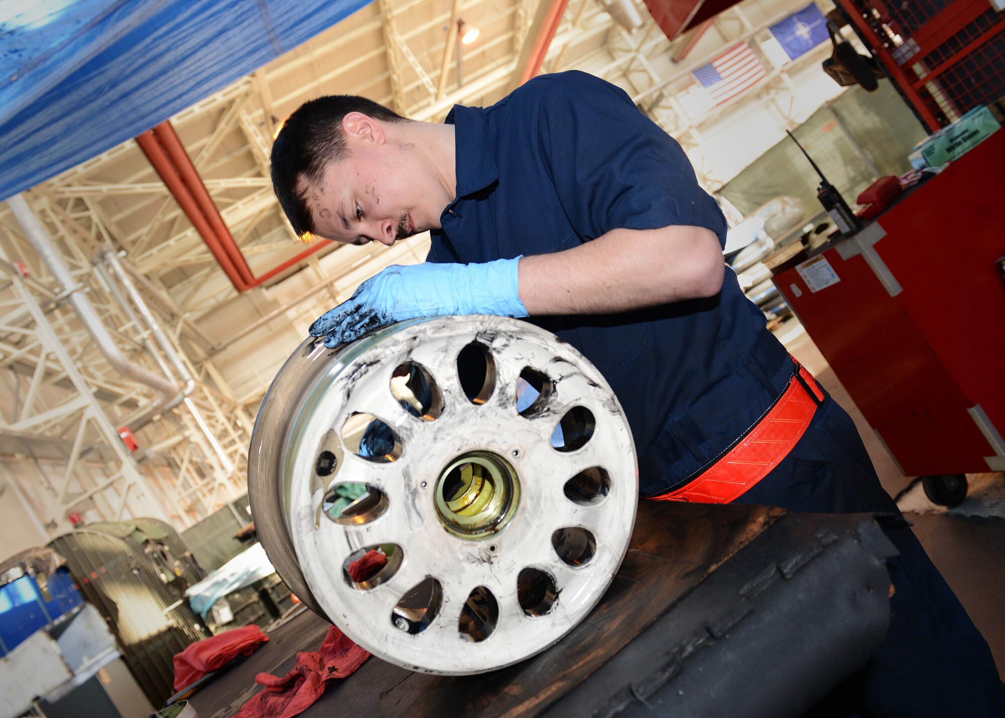 Transient alert technicians maintain F-16 tires > Aviano Air Base > Display