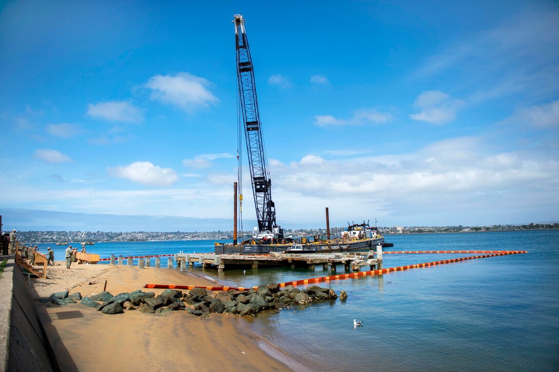 Navy Seabees reconstruct a historic seaplane ramp at Naval Air Station ...