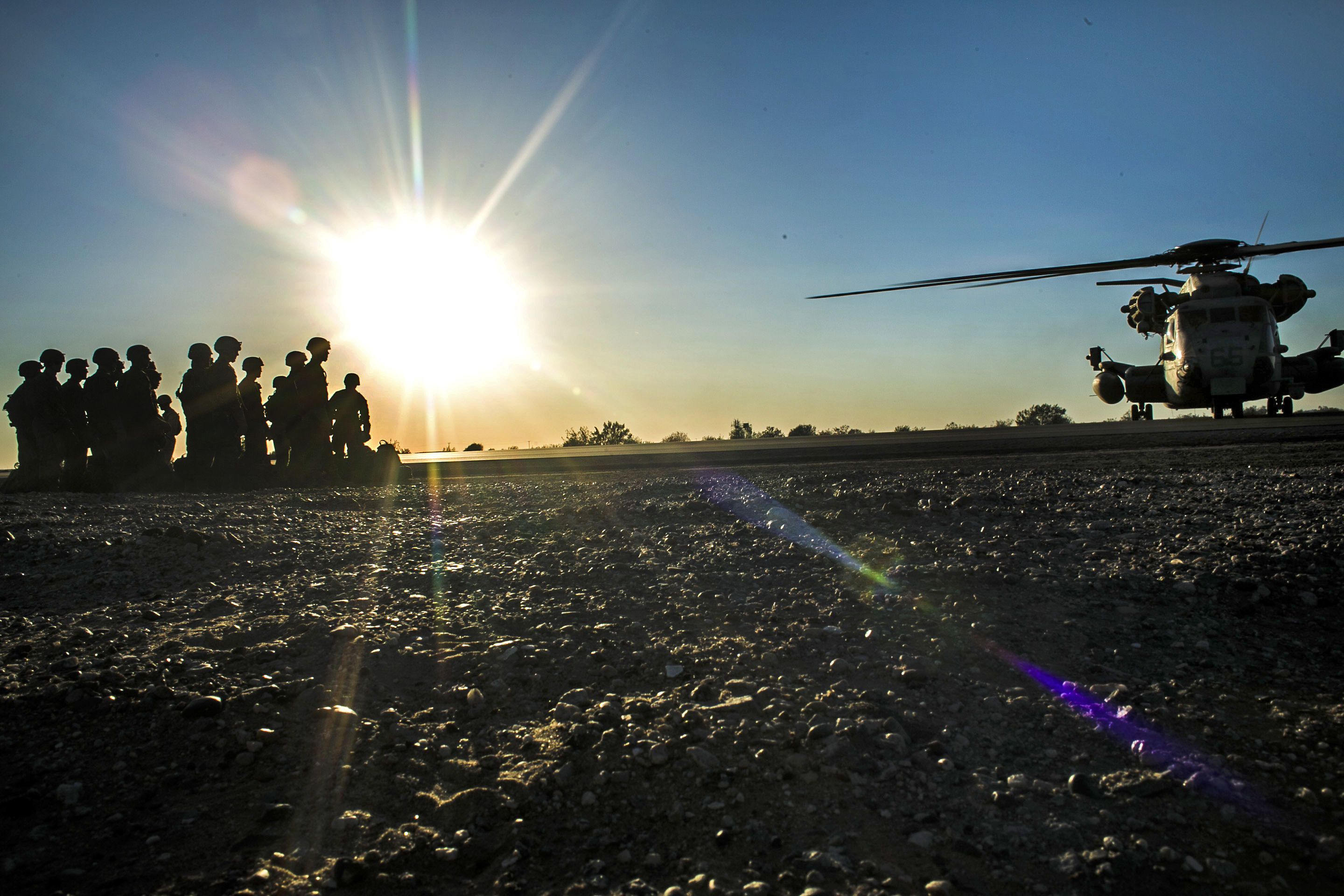 Marines attending the infantry officers course prepare to conduct fast ...