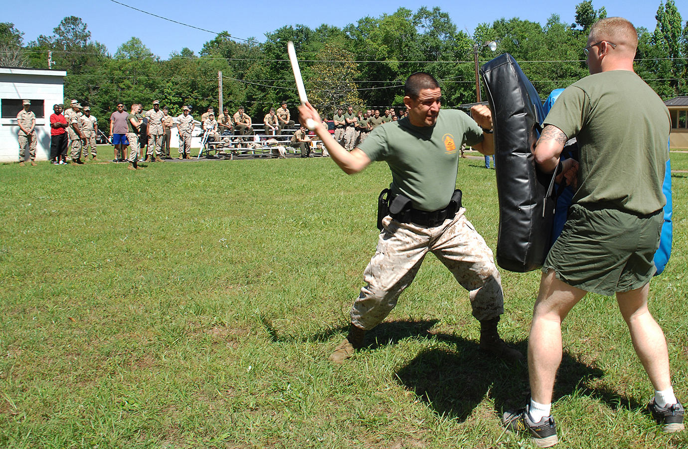 SAF augmentees fight through OC spray obstacle course