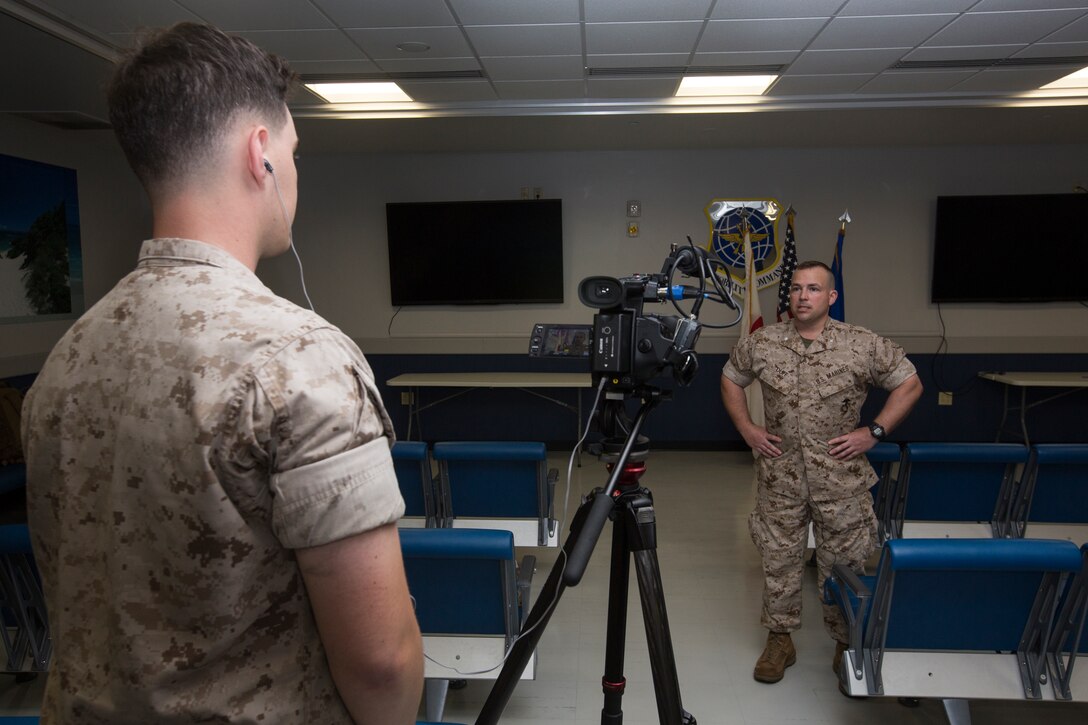 U.S. Marine Lance Cpl. Nick Hatheway interviews U.S. Marine Corps Lt ...