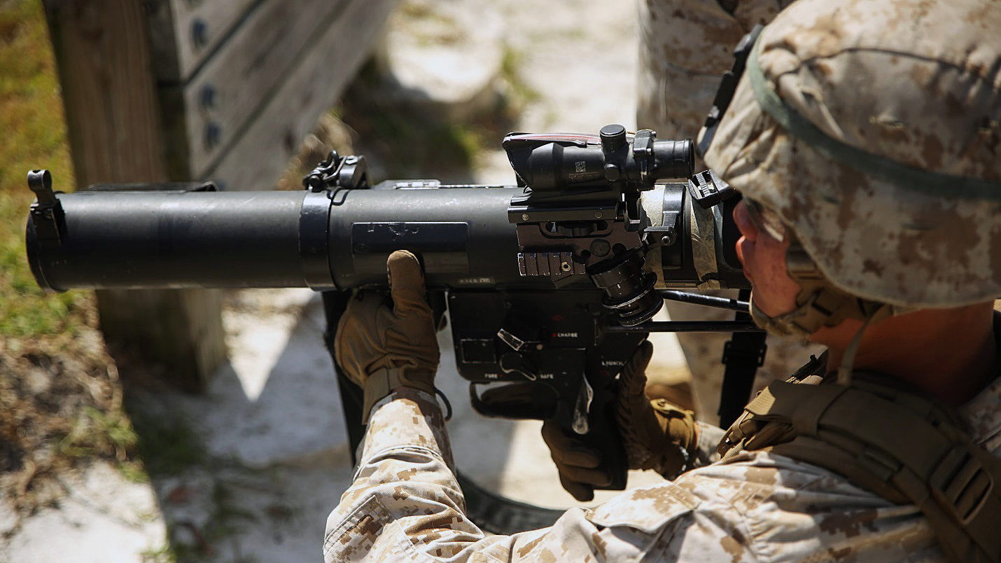 A Marine prepares to fire an AT4 anti-tank weapon during live-fire ...