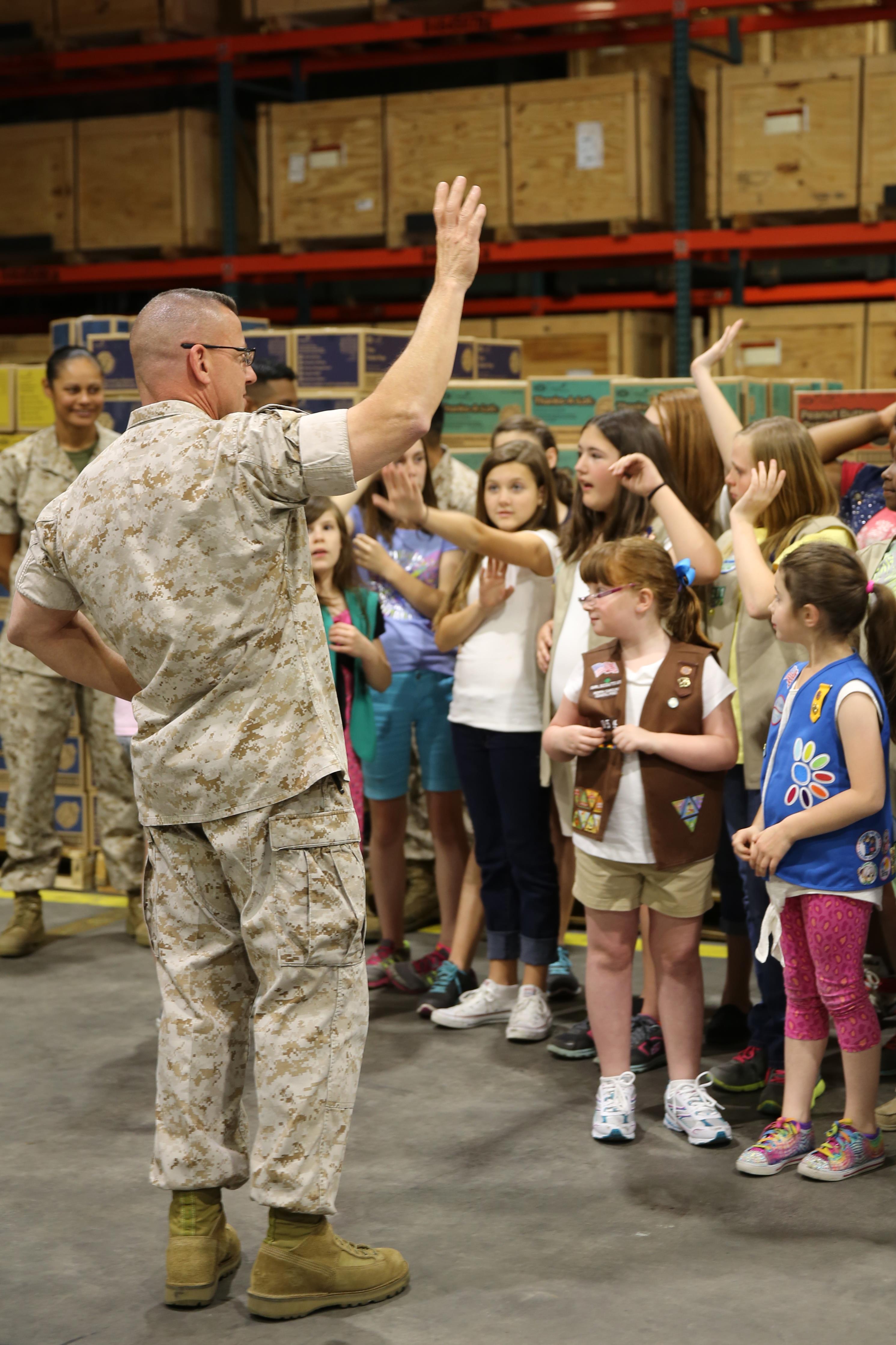 Girl Scouts deliver 8,400 boxes of cookies to Cherry Point
