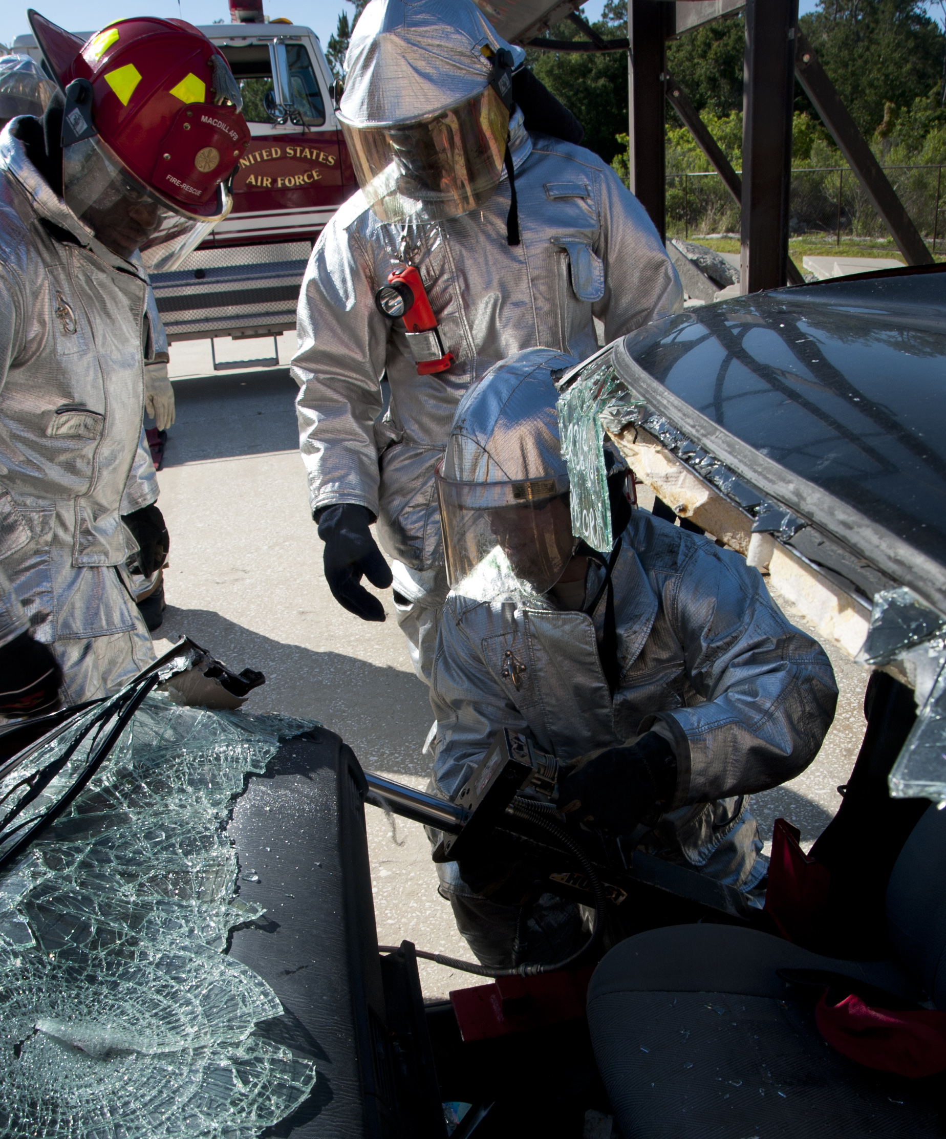 6th CES FIrefighters conduct Vehicle Extraction Training