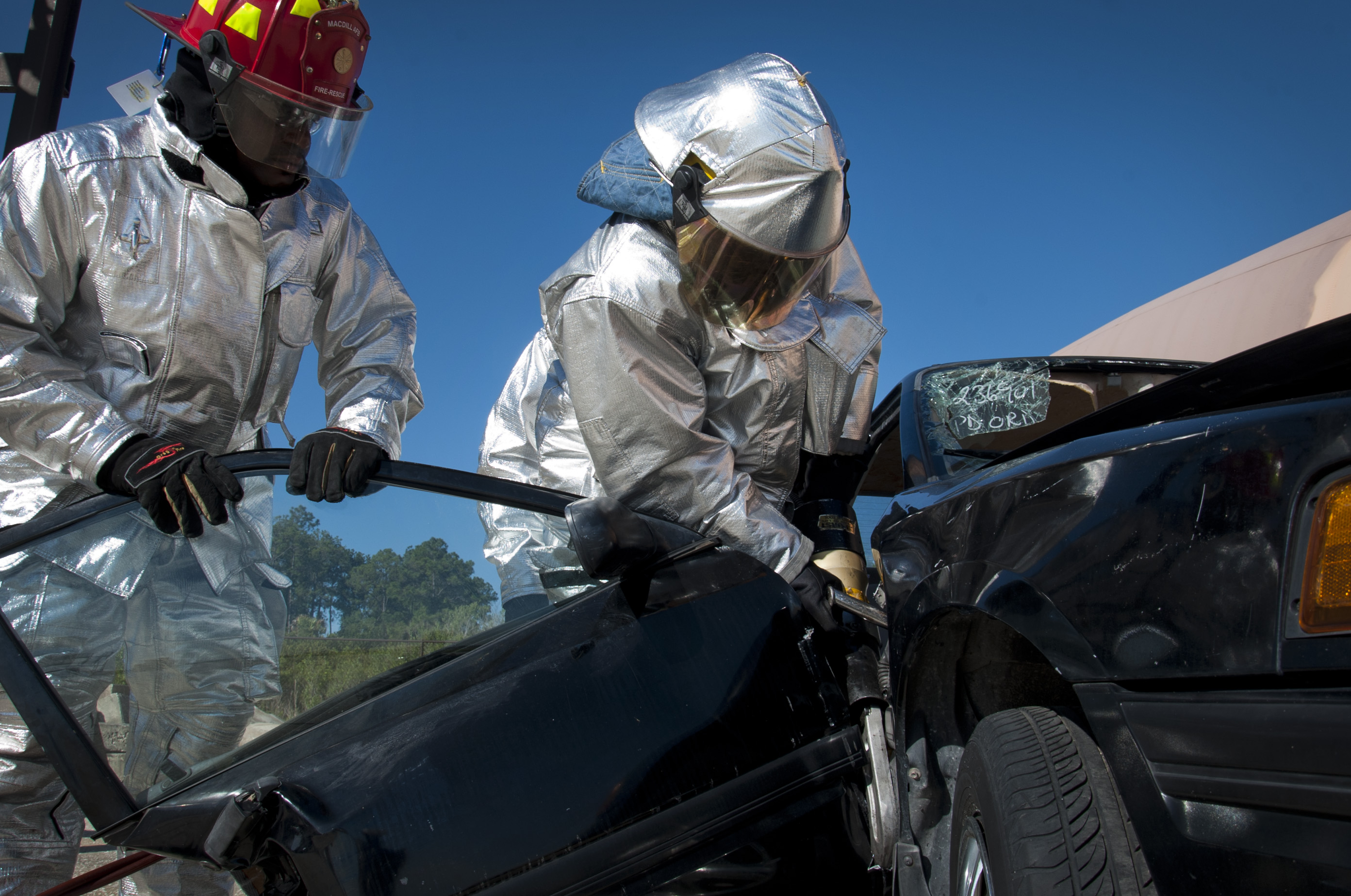 6th CES FIrefighters conduct Vehicle Extraction Training