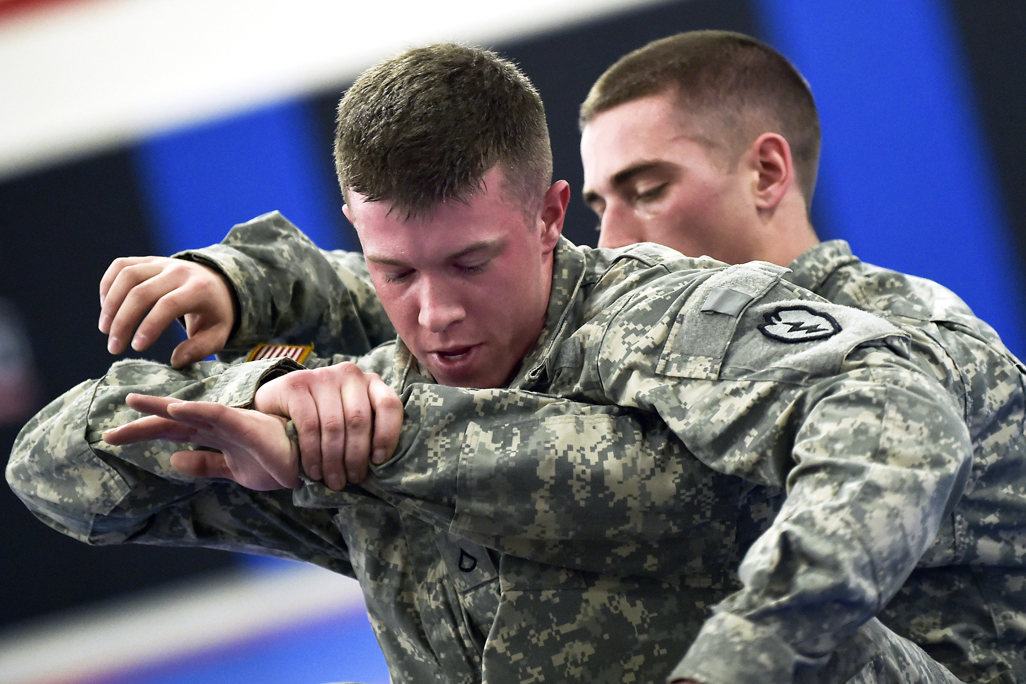 Army Pfcs. Randenn Snider, front, and Andrew Rona compete in a combined ...