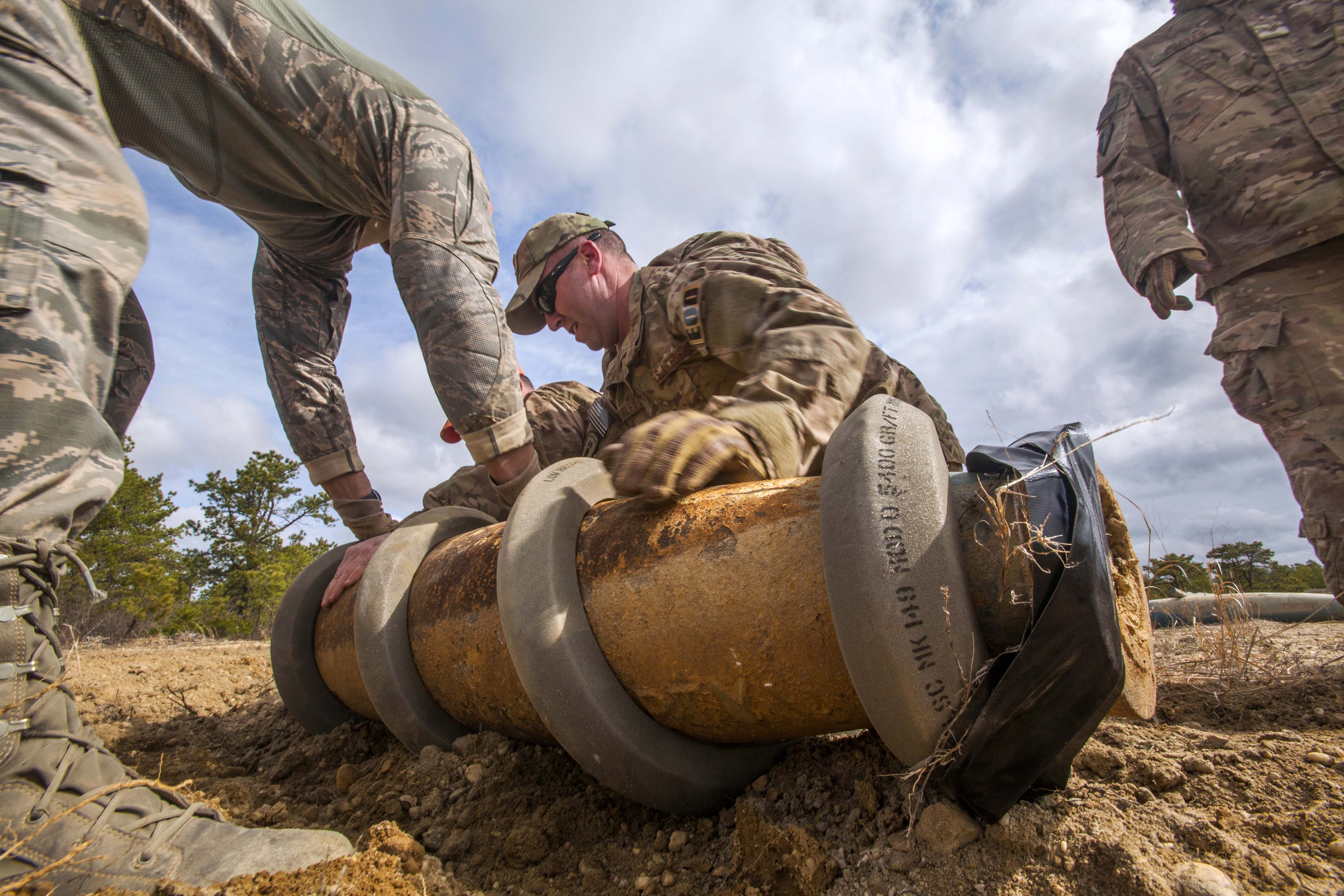 New Jersey Air National Guard Tech. Sgt. John F. Hurley Jr., center ...
