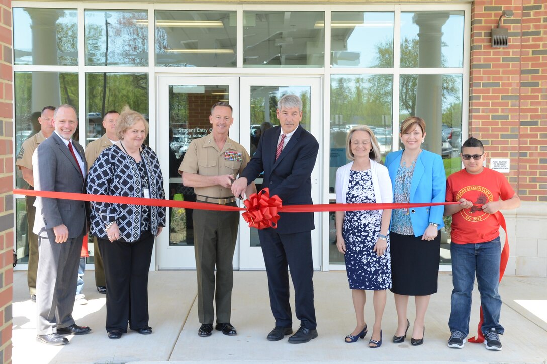 Ribbon cutting marks opening of crossroads elementary
