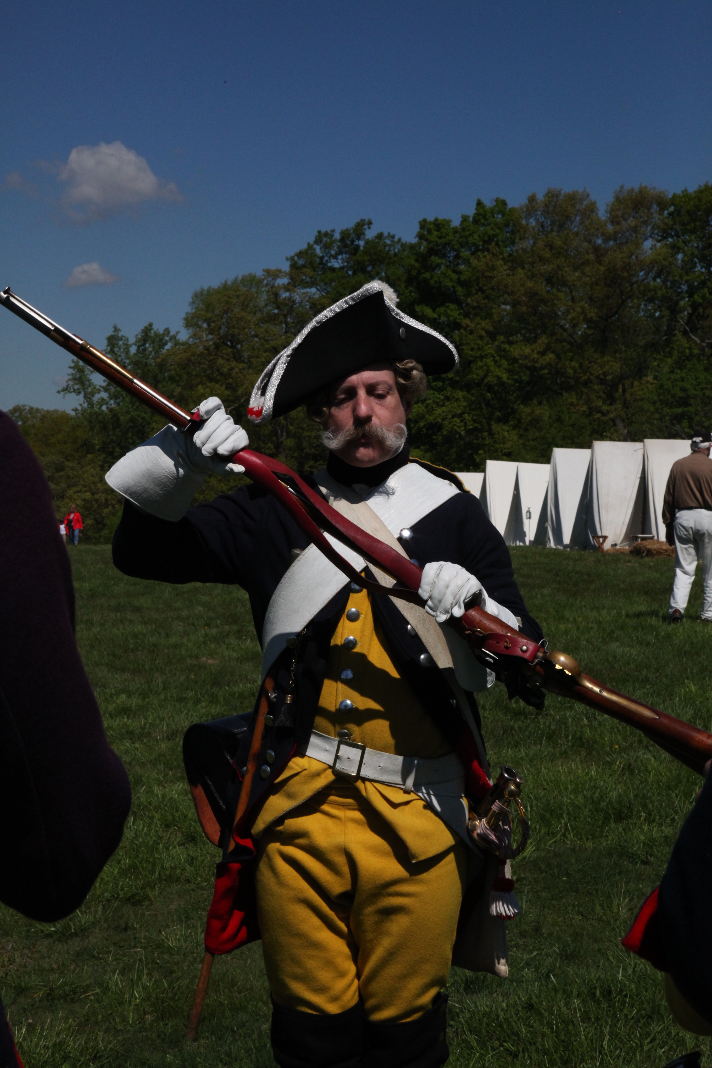 Reenactors from Continental, British armies, and camp followers meet at ...