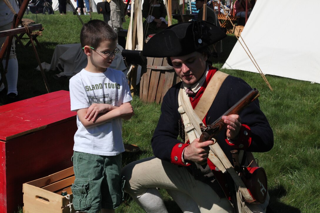 Reenactors from Continental, British armies, and camp followers meet at ...