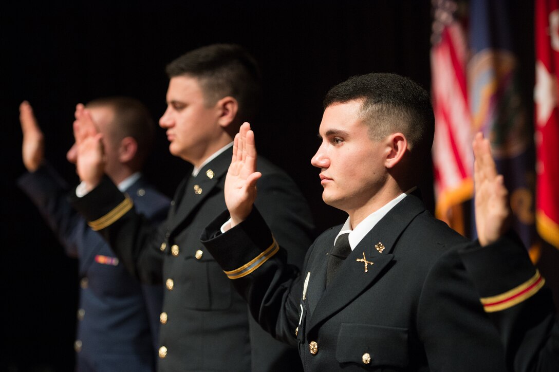 Kansas State University Army and Air Force ROTC cadets take the oath of ...