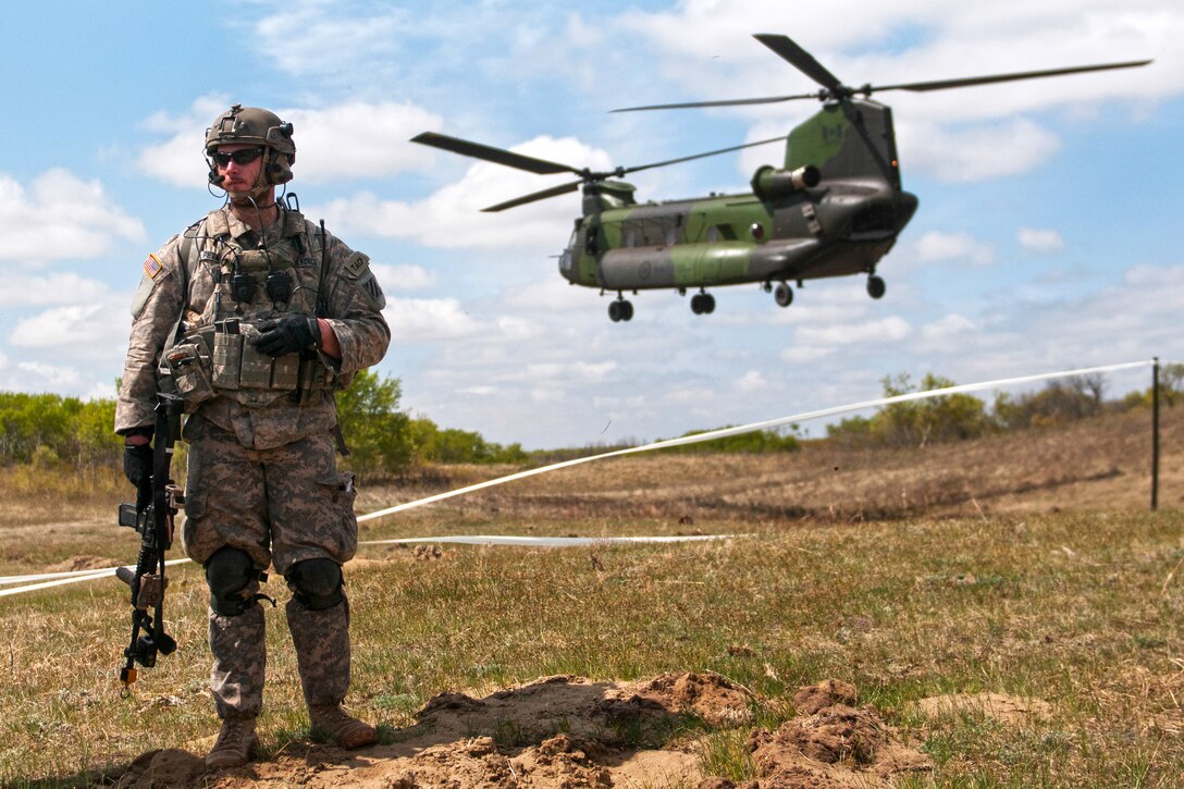 U.S. Air Force Senior Airman Jorden Petracco prepares to direct U.S ...