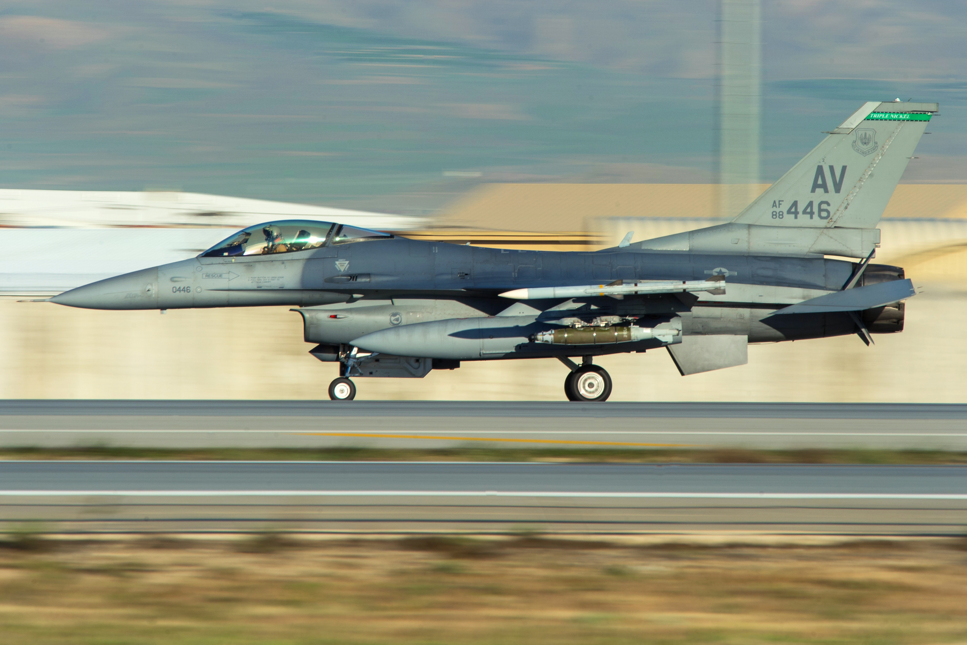 A U.S. Air Force F-16 Fighting Falcon aircraft lands at Bagram Airfield ...